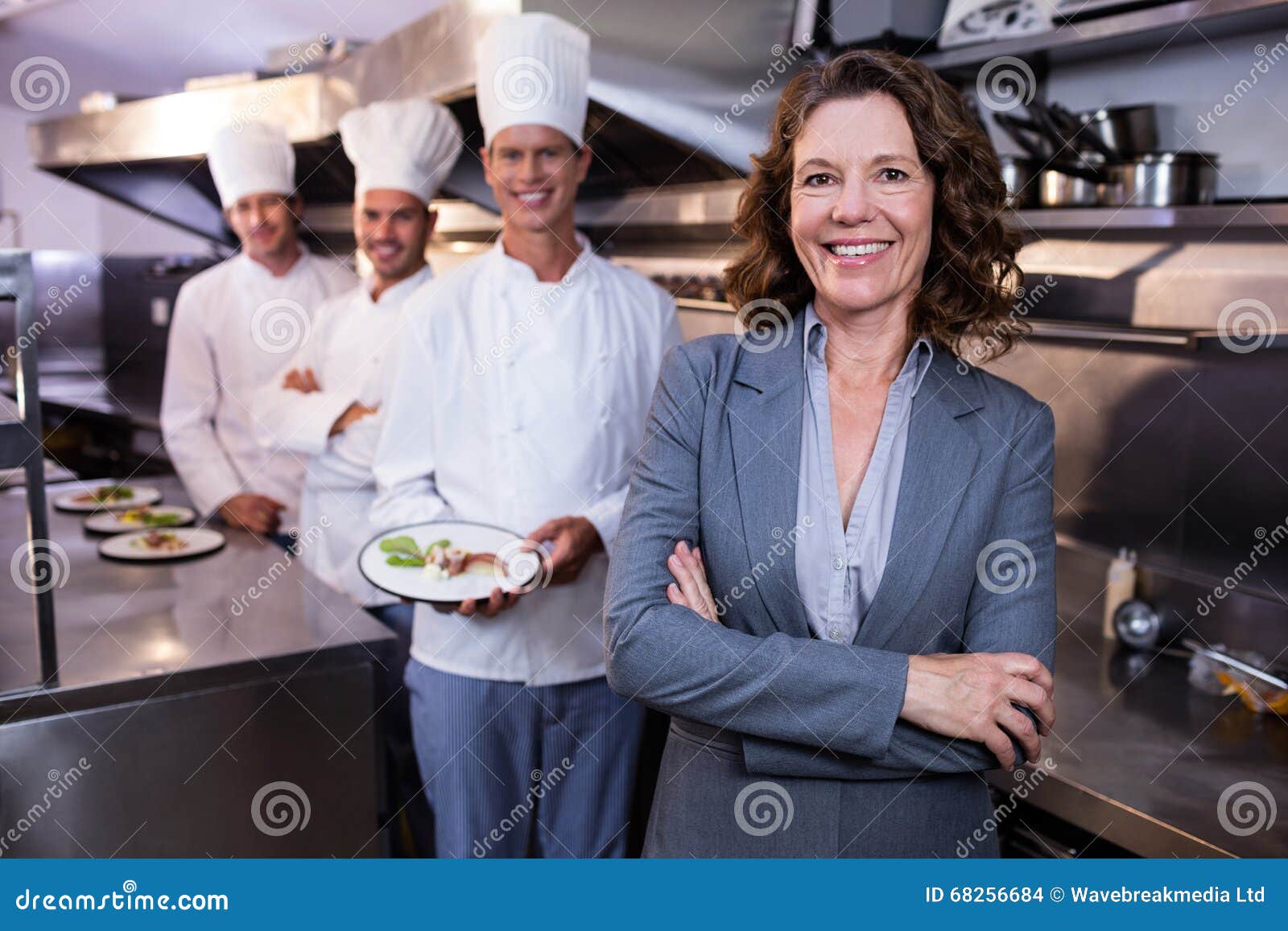 Restaurant Manager Posing in Front of Team of Chefs Stock Photo - Image ...
