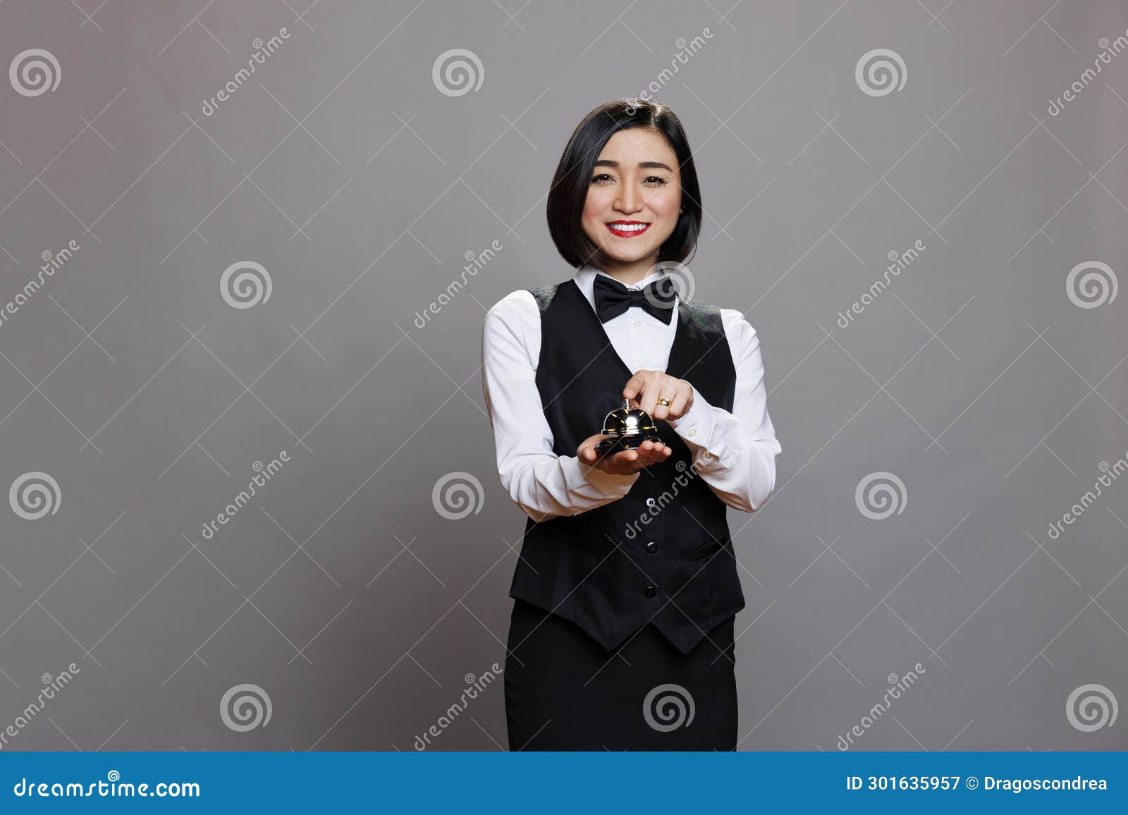 Restaurant Receptionist Ringing Bell Stock Image - Image of posing ...