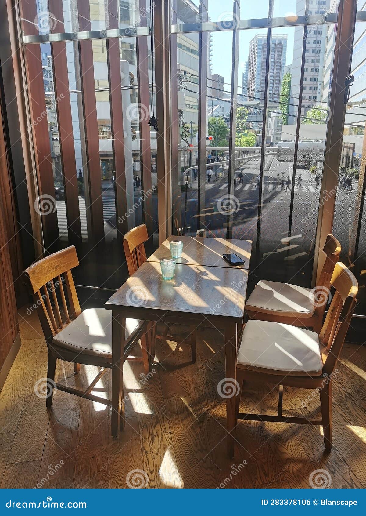 Restaurant Table and Chairs by Window and View of Tokyo Street Stock ...