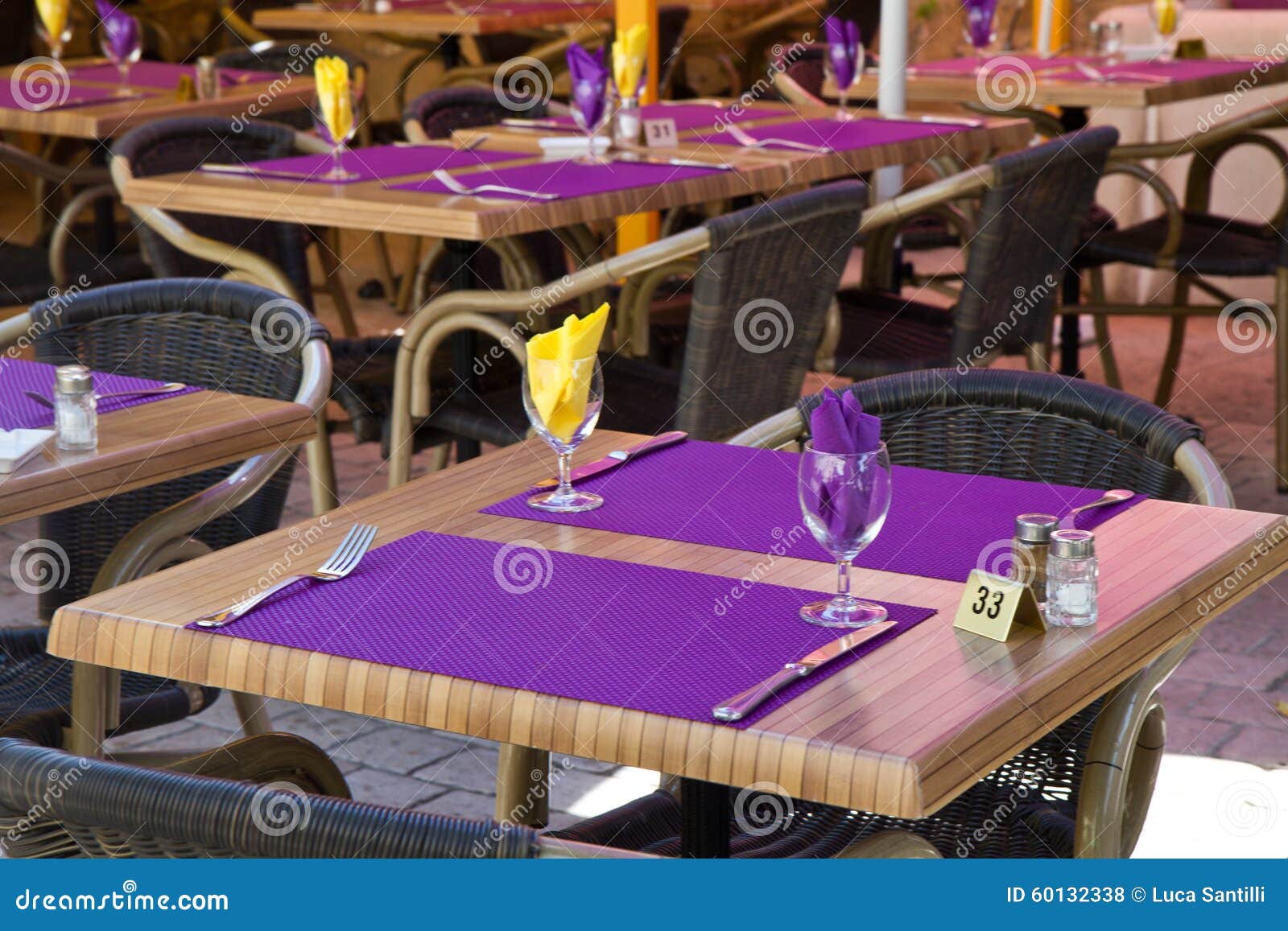 Restaurant Table with Purple Placemat Stock Photo - Image of cafe ...