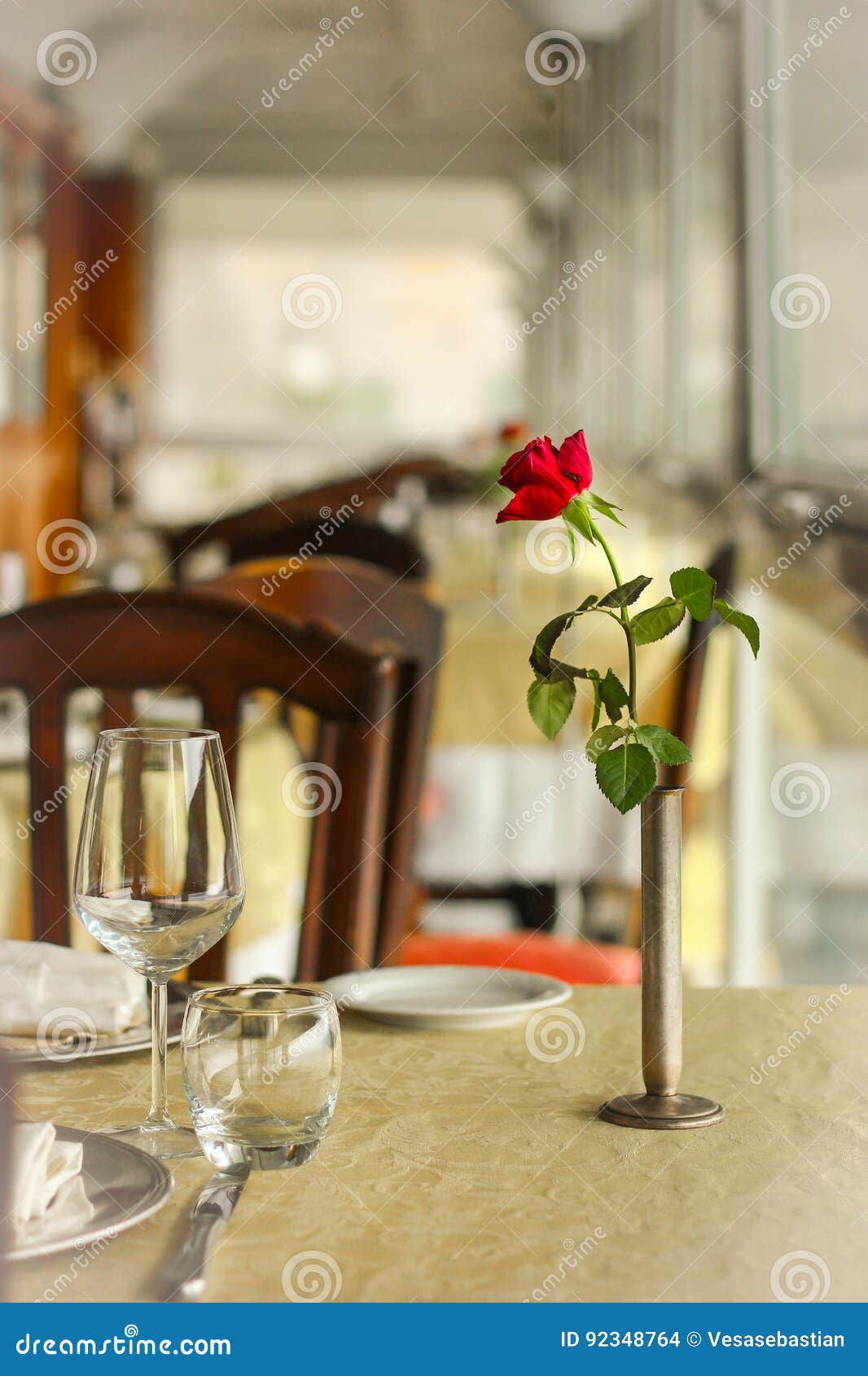 Restaurant table with rose stock photo. Image of celebration - 92348764