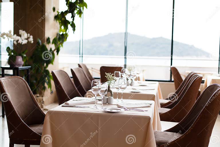 Restaurant Table Set by the Window Stock Image - Image of transparent ...