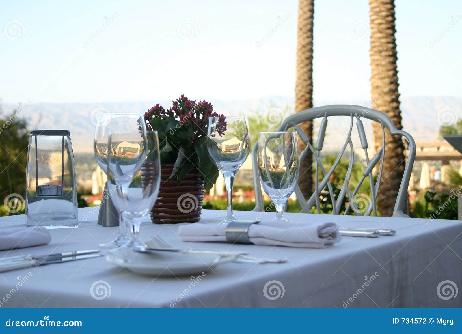 Restaurant table at sunset stock photo. Image of starched - 734572