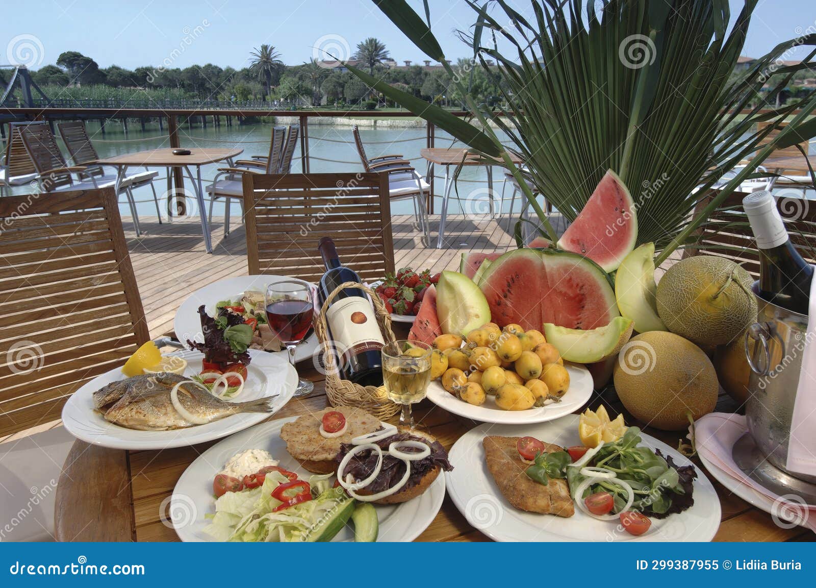Restaurant Table with a Variety of Food on the Beach. Stock Image ...