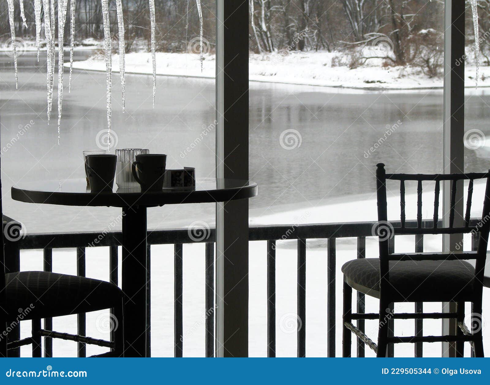Restaurant Table by the Window with View of Frozen Winter River Stock ...