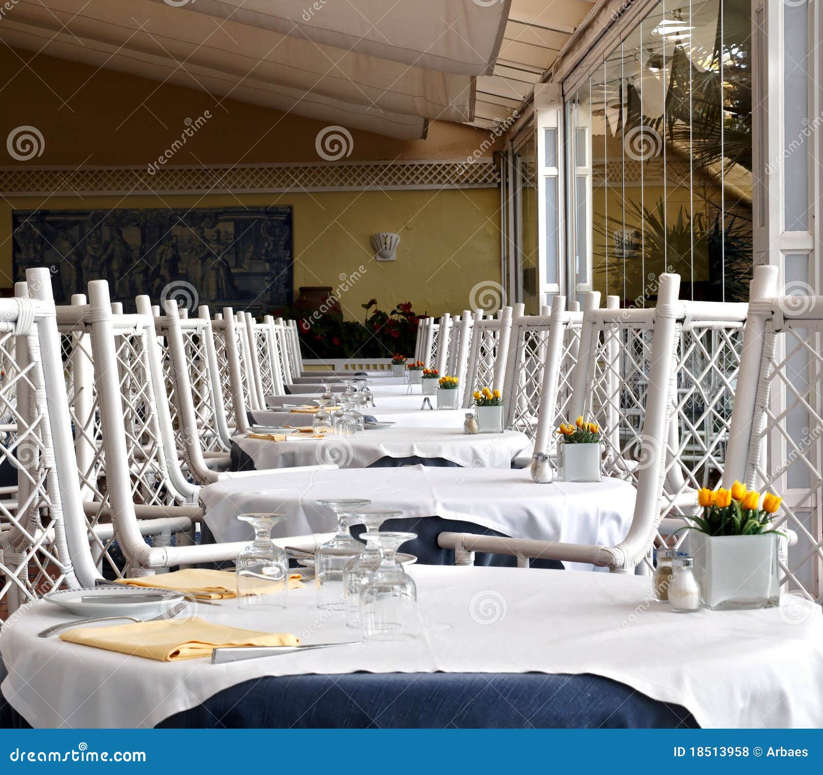 Restaurant Tables and a Big Window Stock Photo - Image of bottle, fork ...