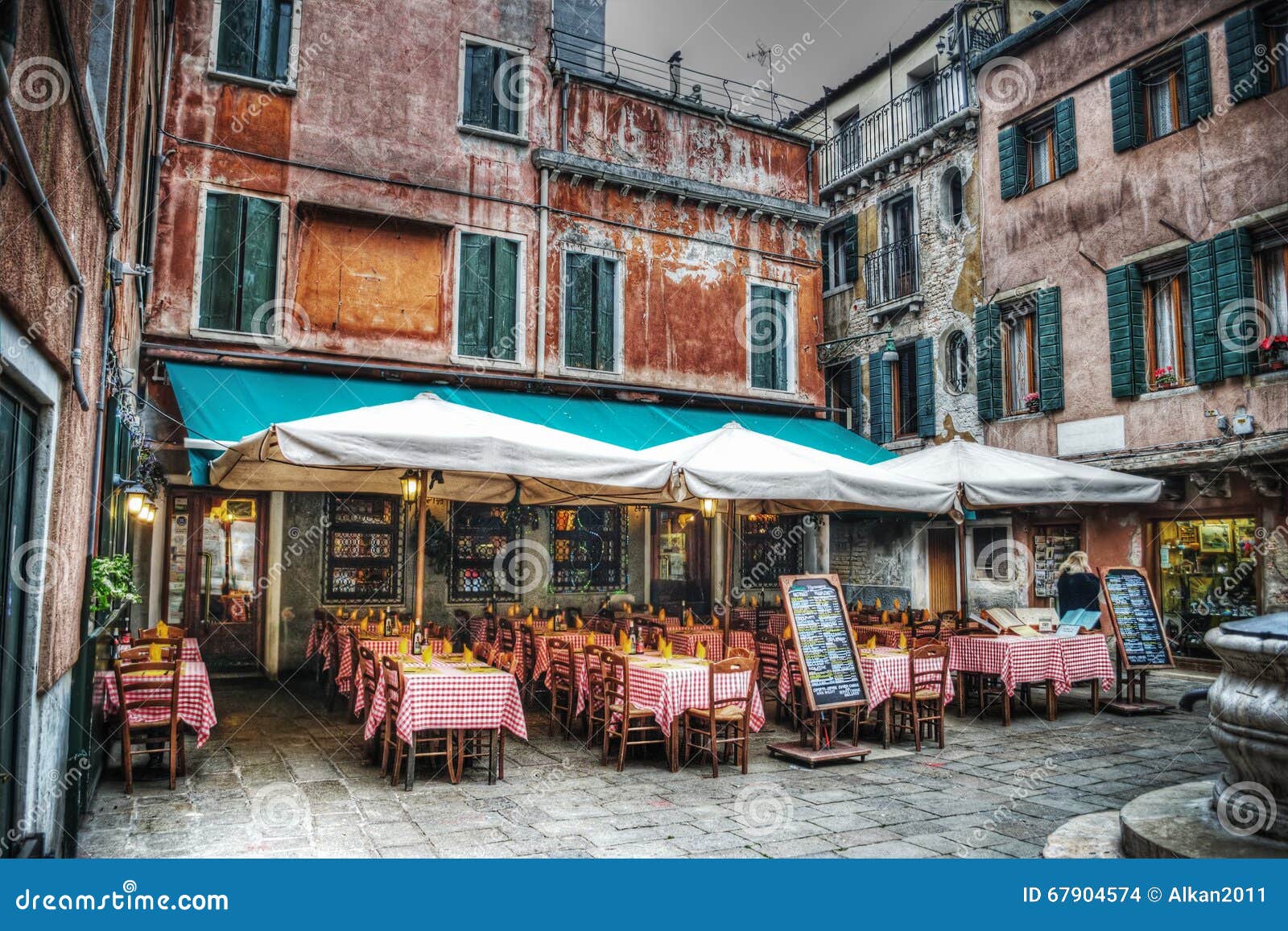 Restaurant Tables and Chiairs in a Small Square Stock Photo - Image of ...