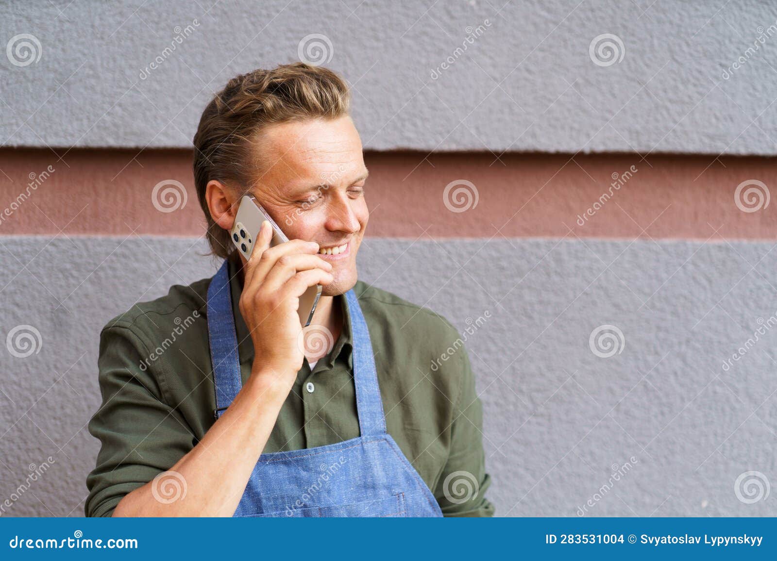 Restaurant Worker Receive Call from Client on Mobile Phone. with Focus ...