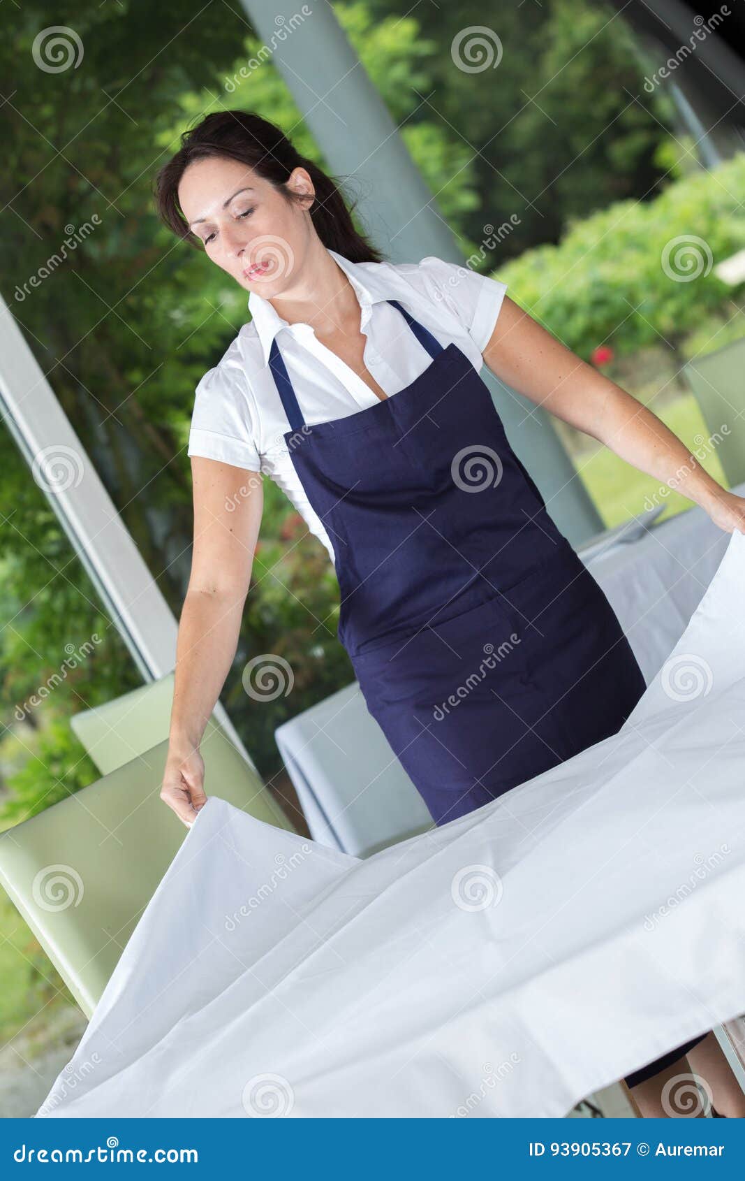Restaurant Worker Setting Up Table Cloth Stock Image - Image of setting ...