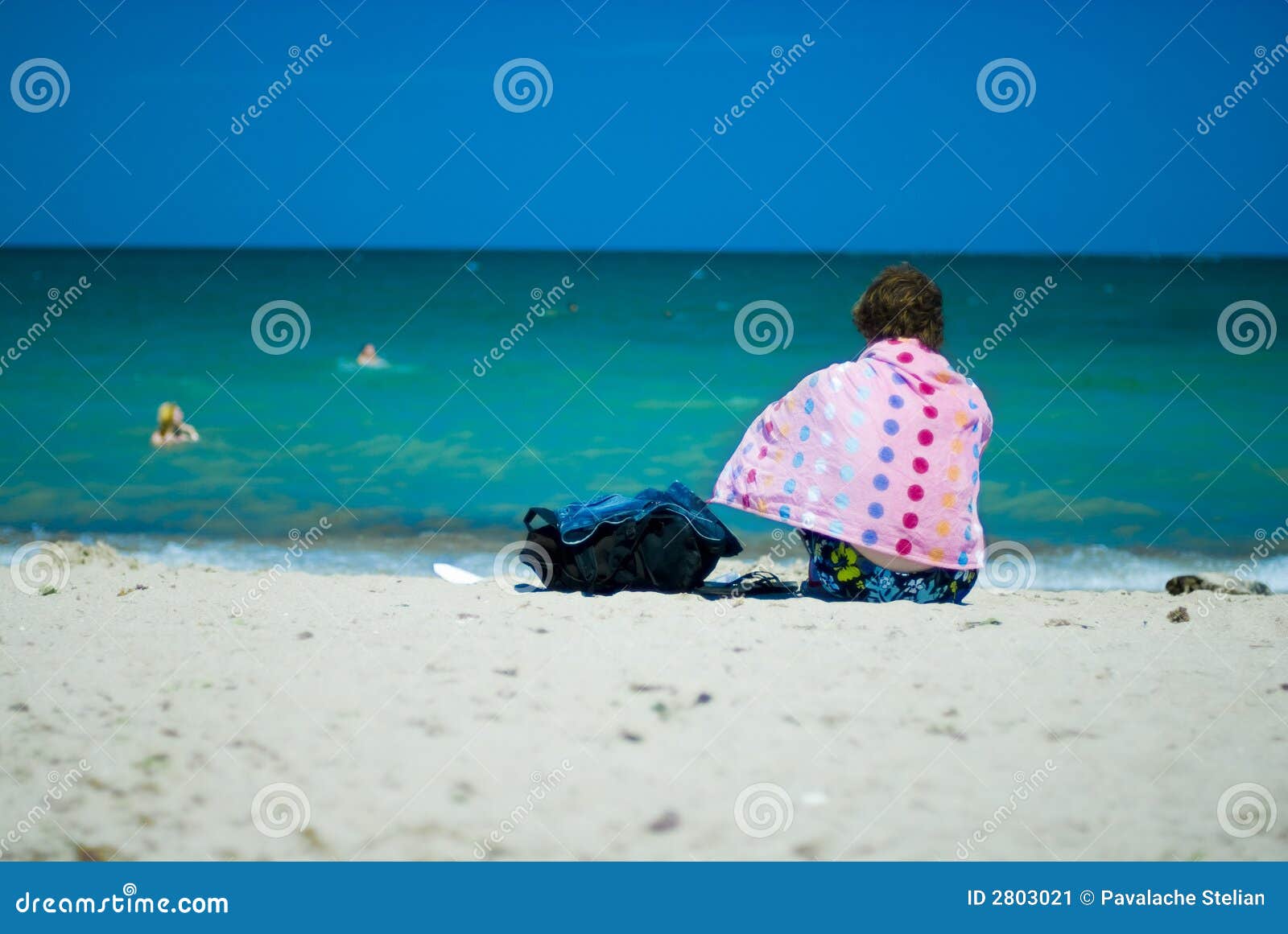 Resting on the beach stock image. Image of skyline, young - 2803021