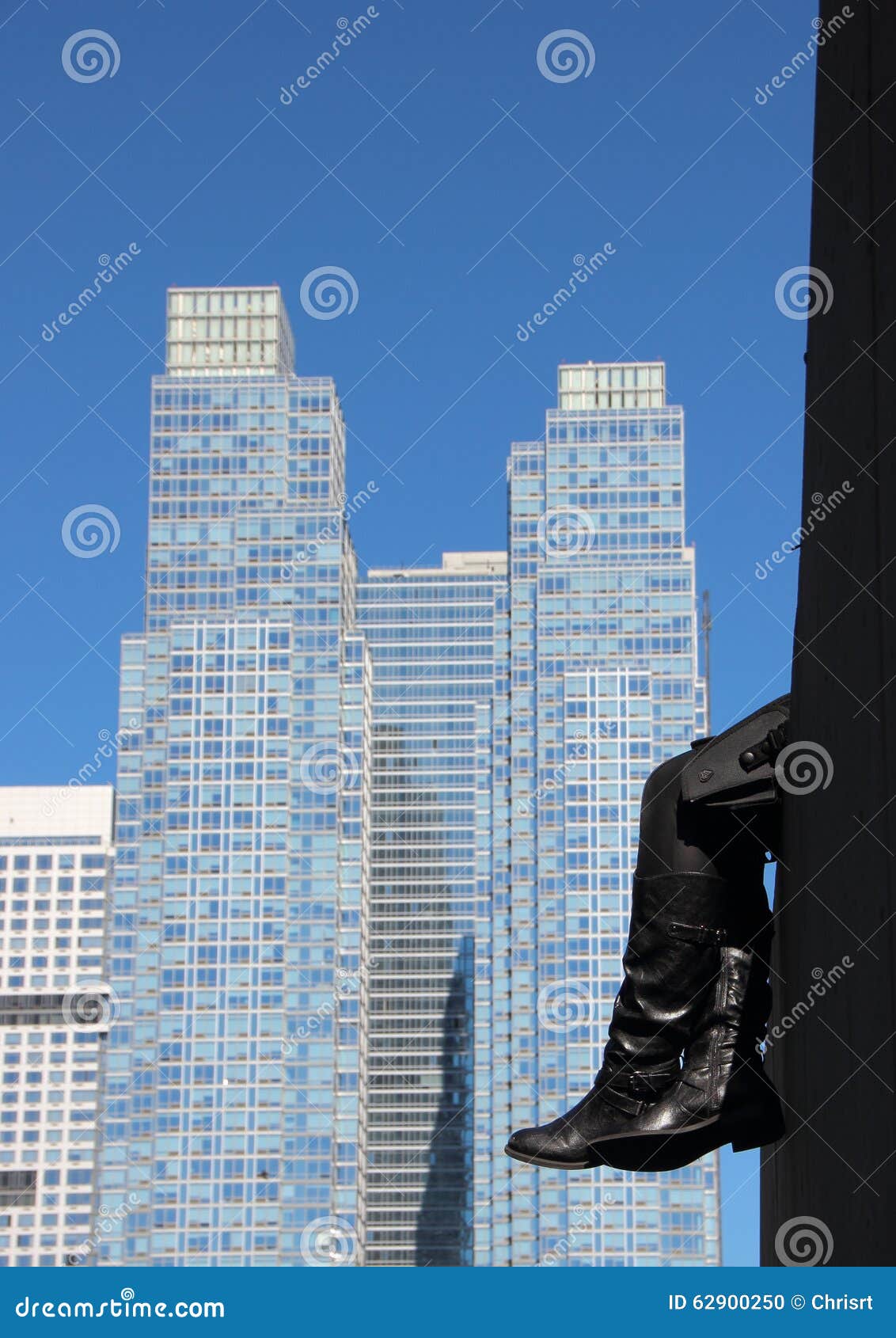 Resting Black Leather Boots with Skyscraper Background Stock Photo ...