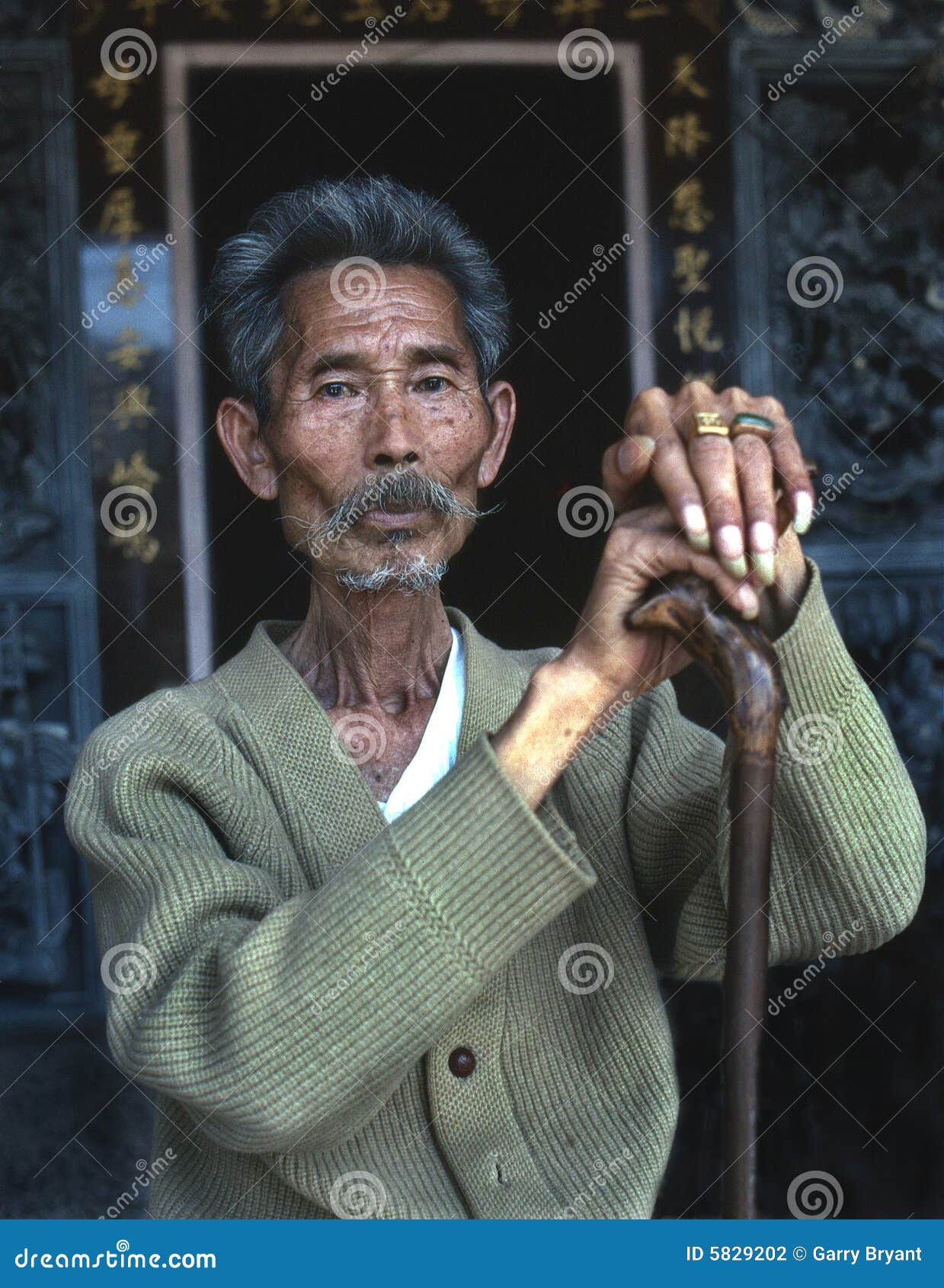 Resting chinese man editorial photography. Image of portrait - 5829202