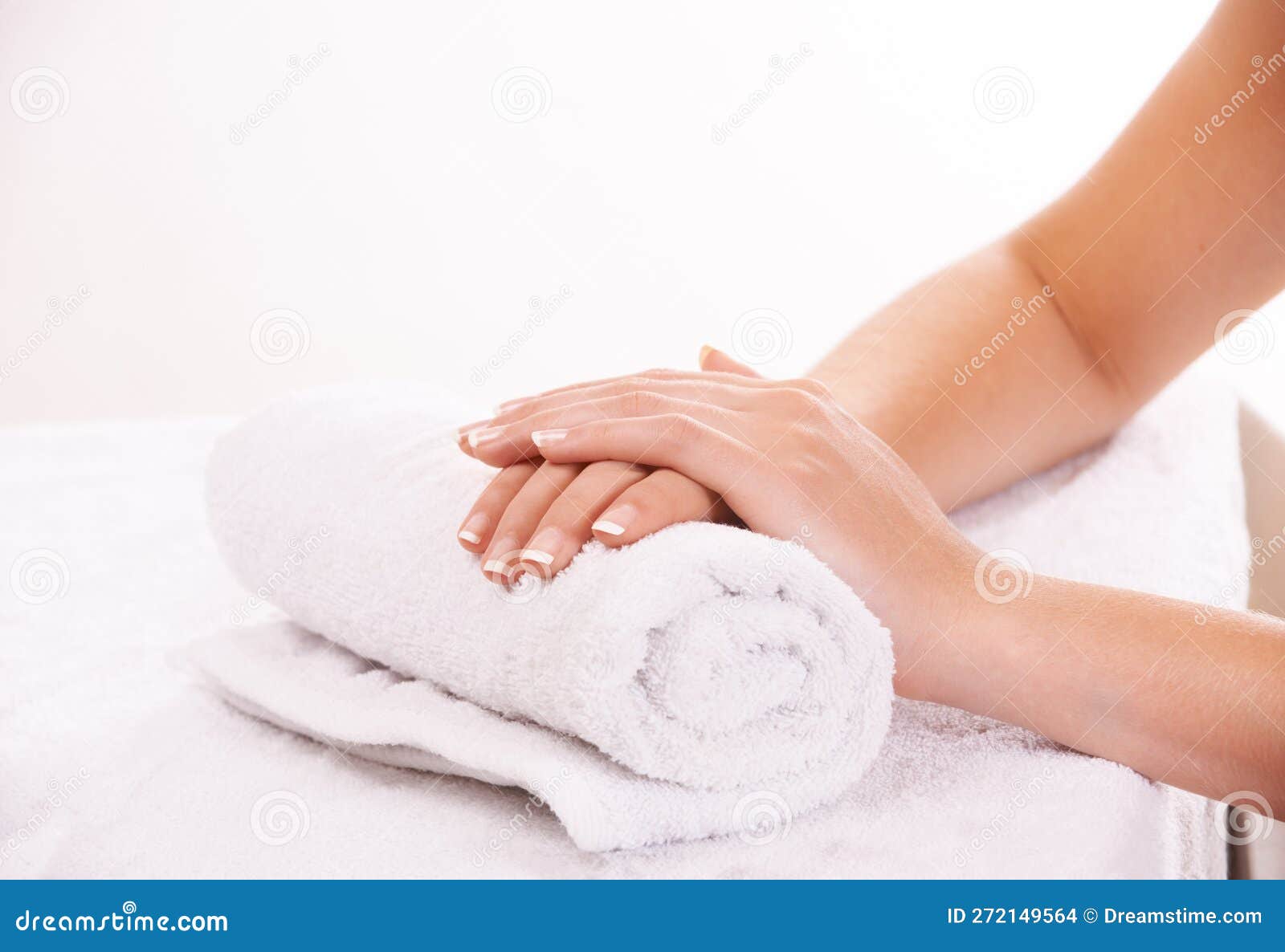 Resting Her Hands after a Manicure. a Womans Hands Resting on a Towel ...