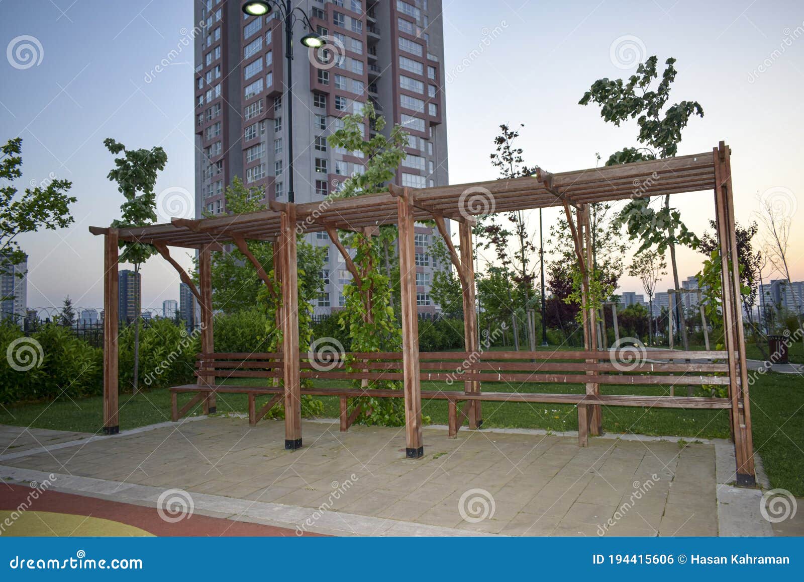 Resting place in the park stock photo. Image of flowers - 194415606