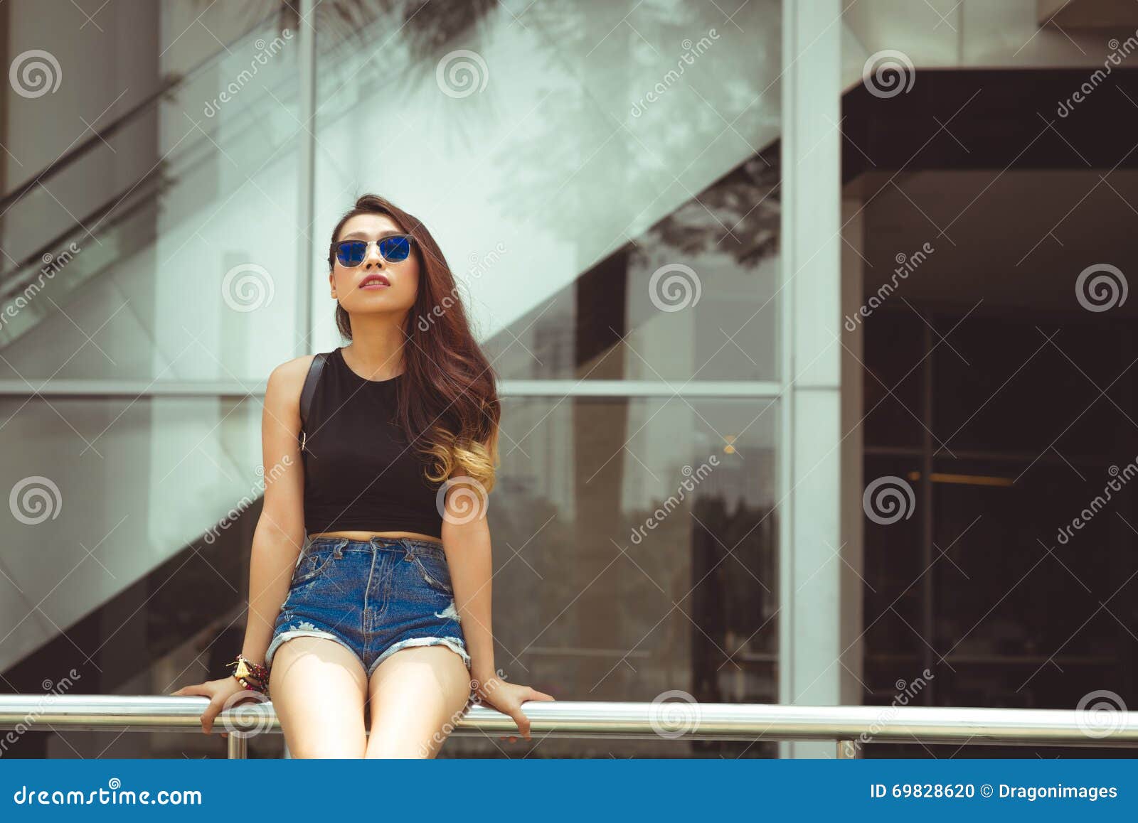 Resting on railing stock photo. Image of vietnamese, woman - 69828620