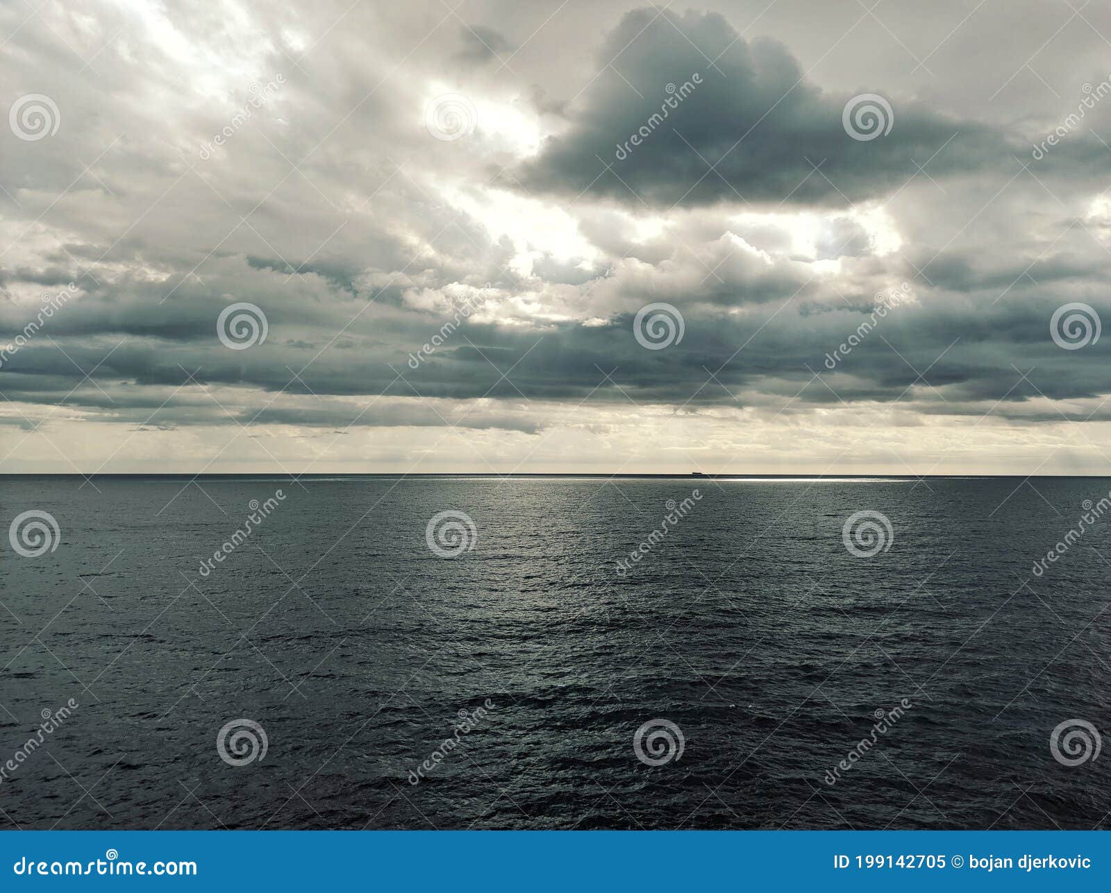 Restless and Blue Sea, with Branches of Warm Sunshine Stock Image ...