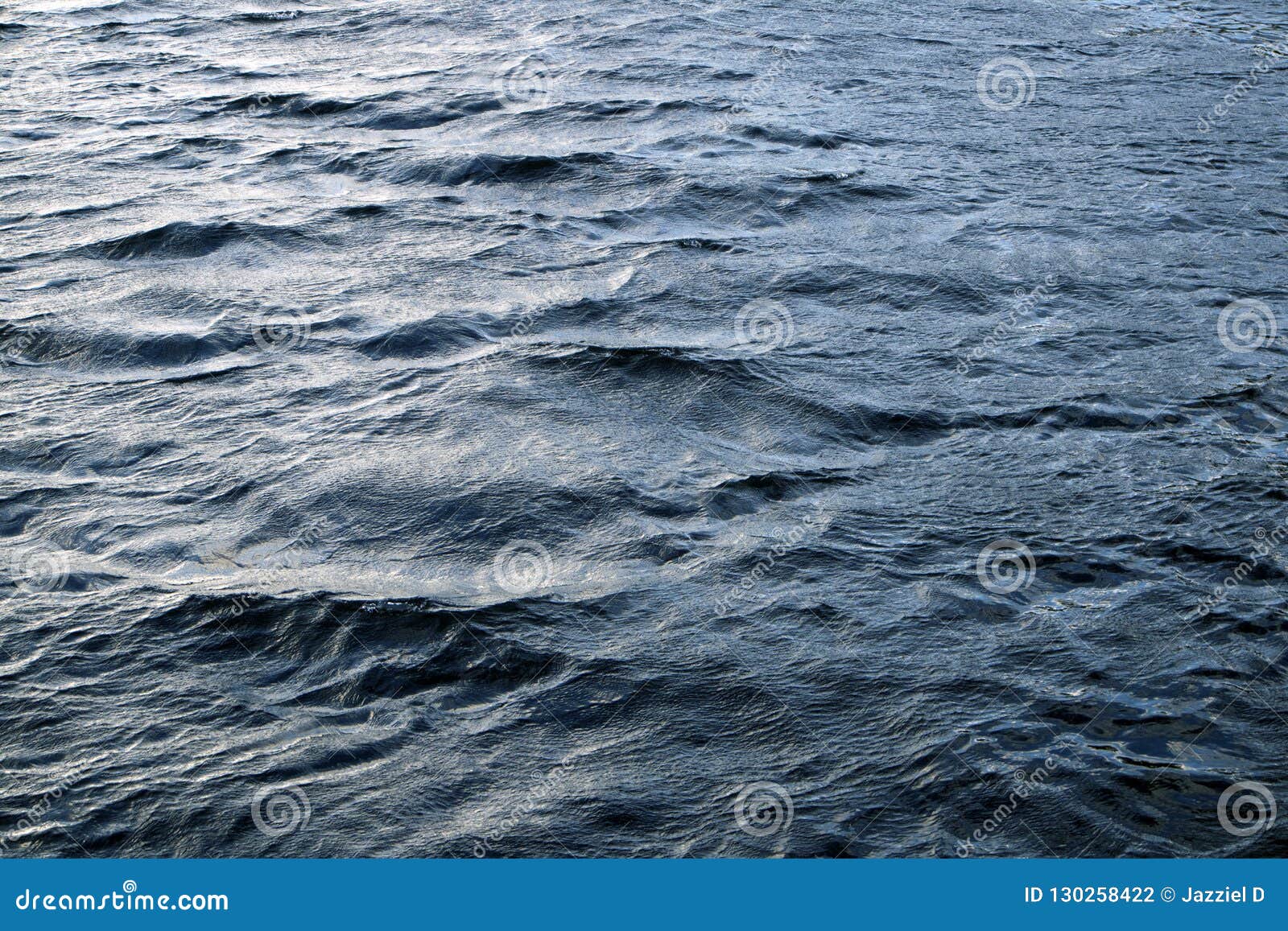 Restless Water Surface with Ripples and Light Glares Stock Photo ...