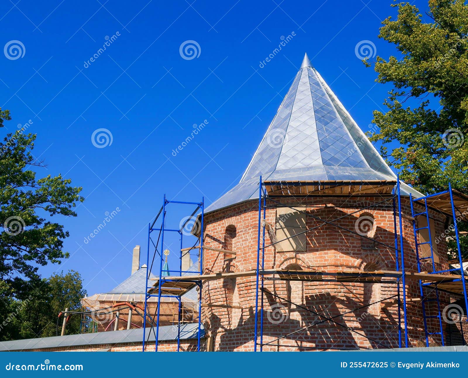 Restoration Of An Old Red Brick Wall. Scaffolding Of Wooden Planks ...