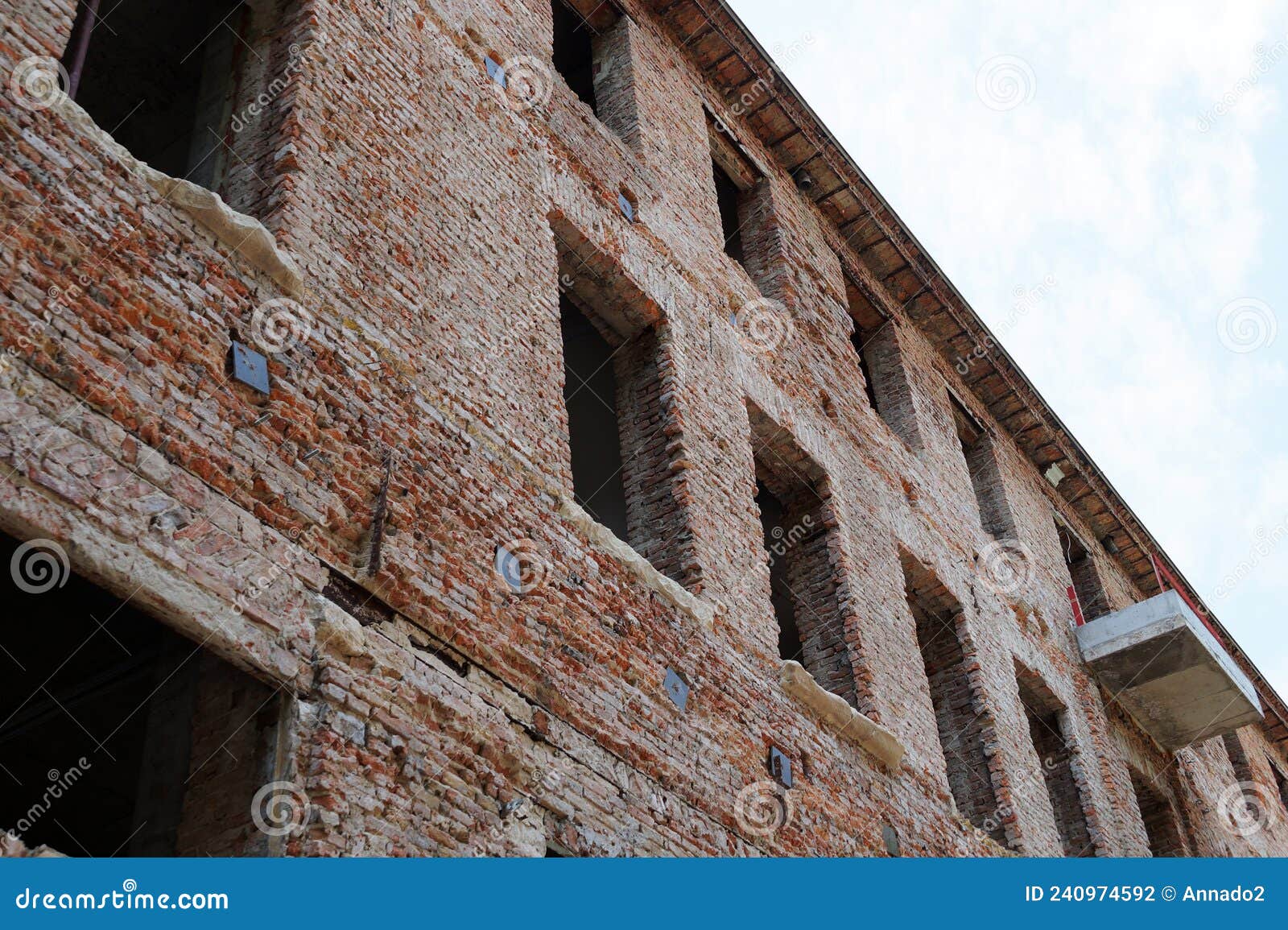 Restoration Of An Old Red Brick Wall. Scaffolding Of Wooden Planks ...