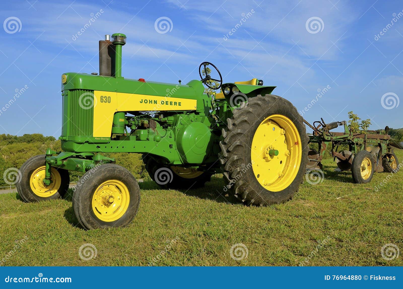 Restored John Deere 630 Tractor and Trip Plow Editorial Image - Image ...