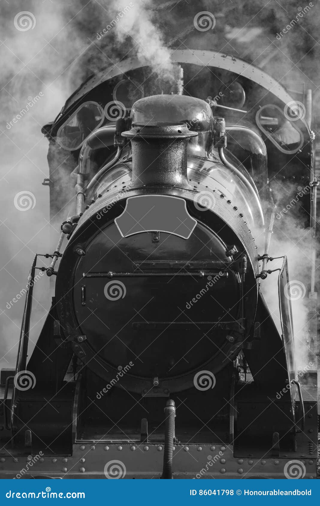 Restored Victorian Era Steam Train Engine with Full Steam in Black and ...