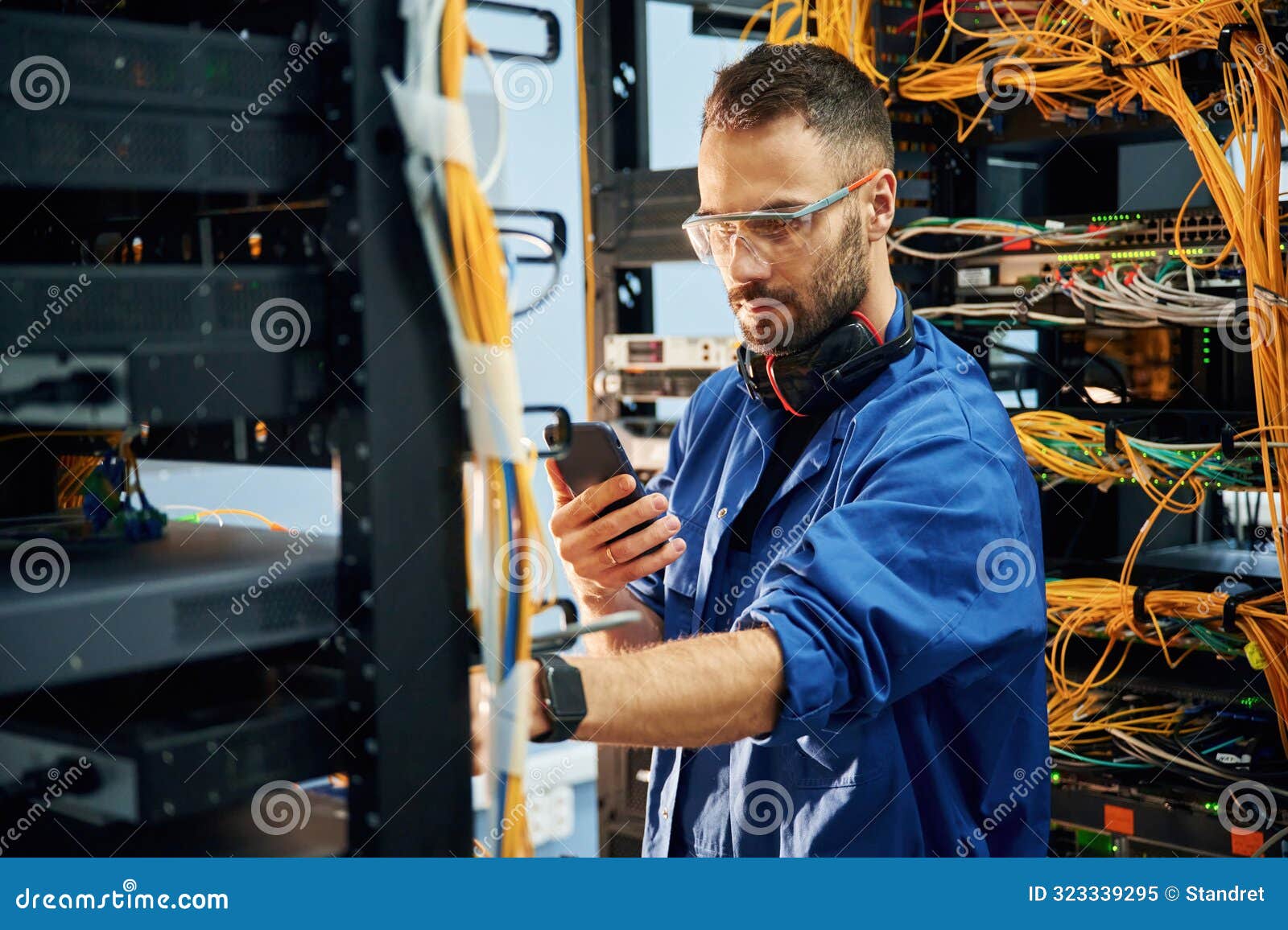 Restoring the Internet Connection. Young Man is Working with Equipment ...