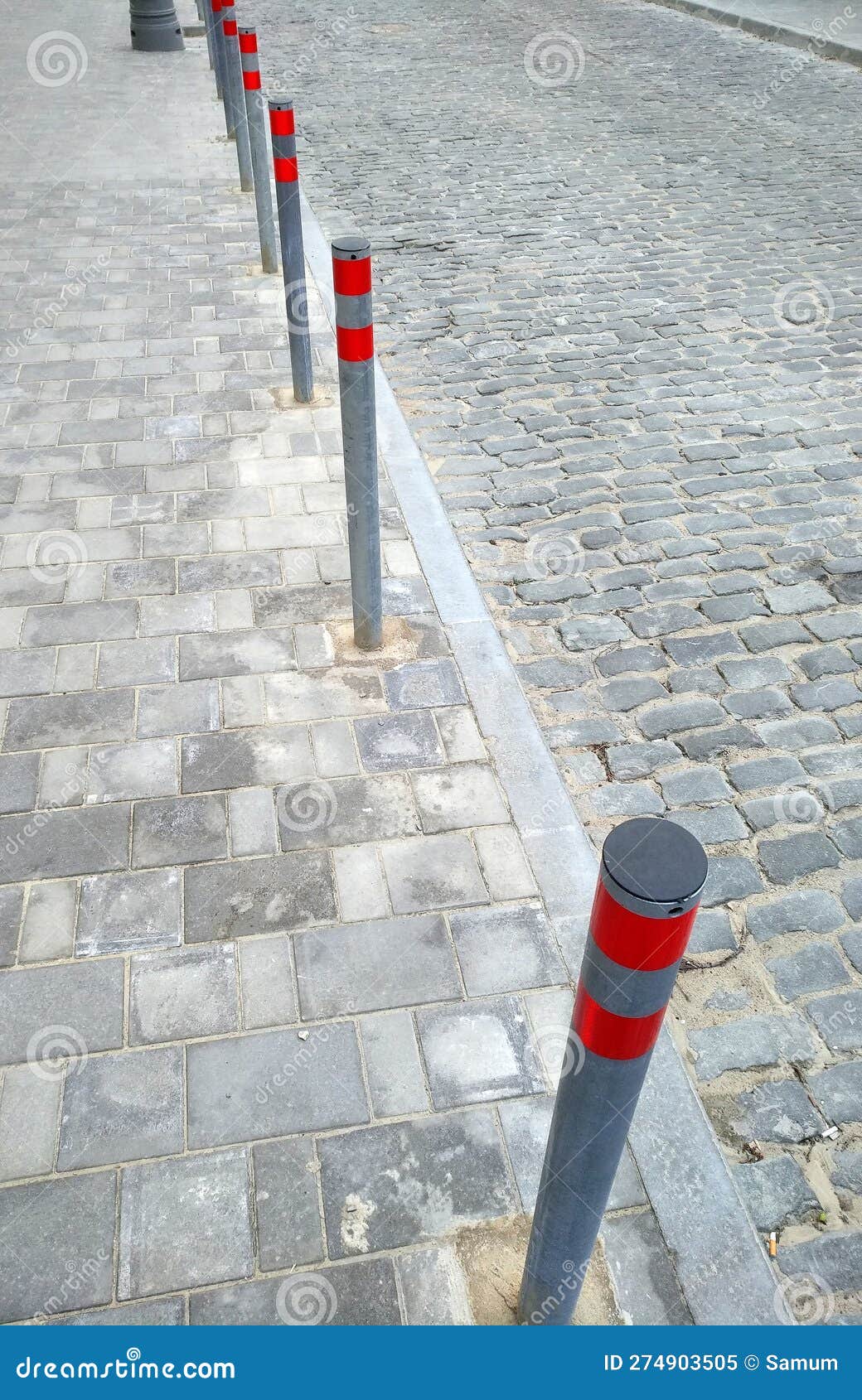 Restrictive Posts between the Pedestrian Sidewalk and the Road Stock ...