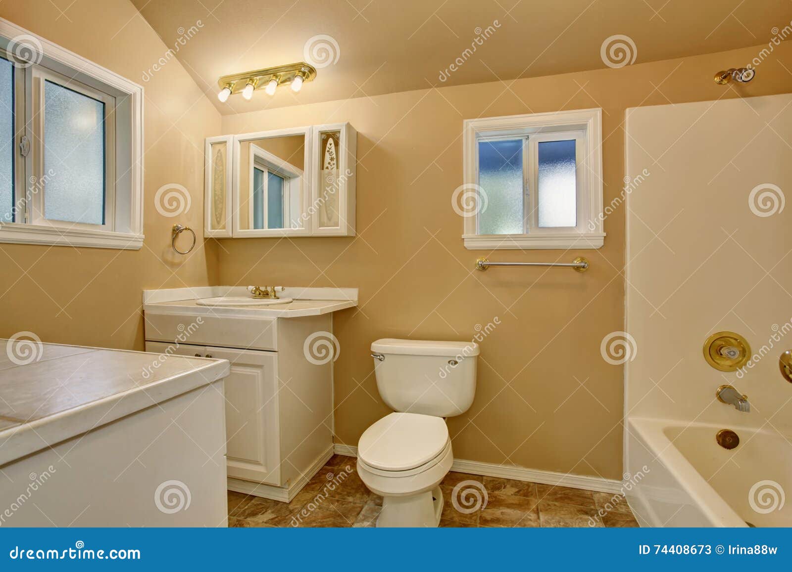 Restroom Interior with Beige Walls. Refreshing White Vanity Cabinet ...