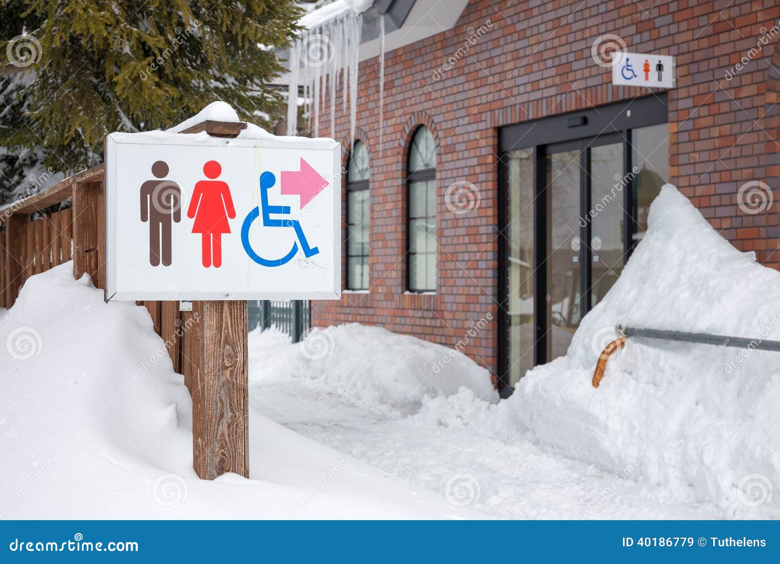 Restroom sign in the snow stock image. Image of entrance - 40186779