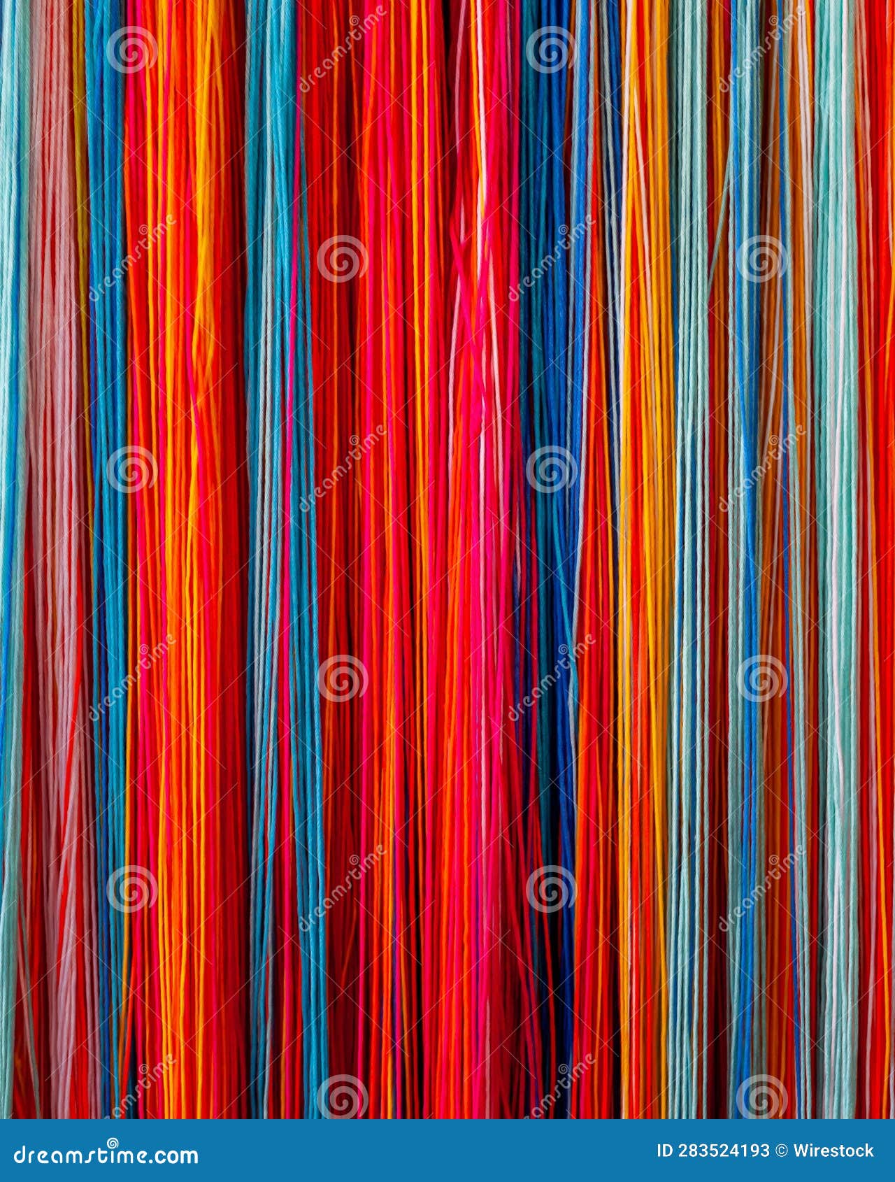 Retail Shop Display Rack Stocked with an Array of Colorful Spools of ...