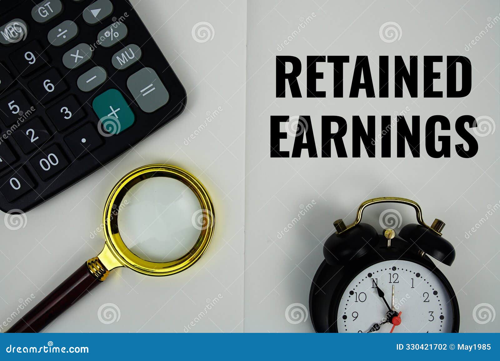 Retained Earnings Text Message Written on Note Page with Calculator ...