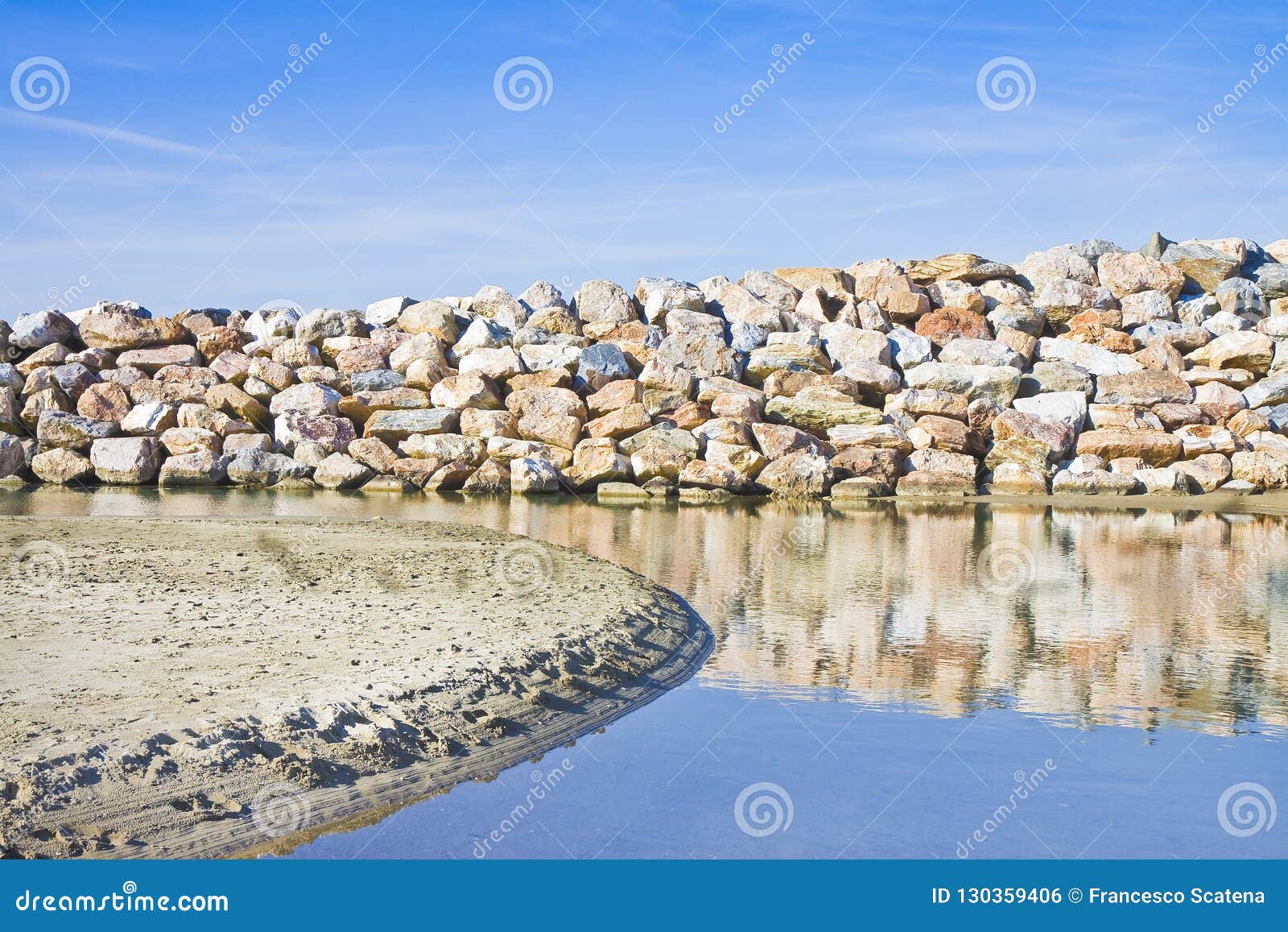 Retaining Breakwater Wall Built with Stone Boulders Stock Photo - Image ...