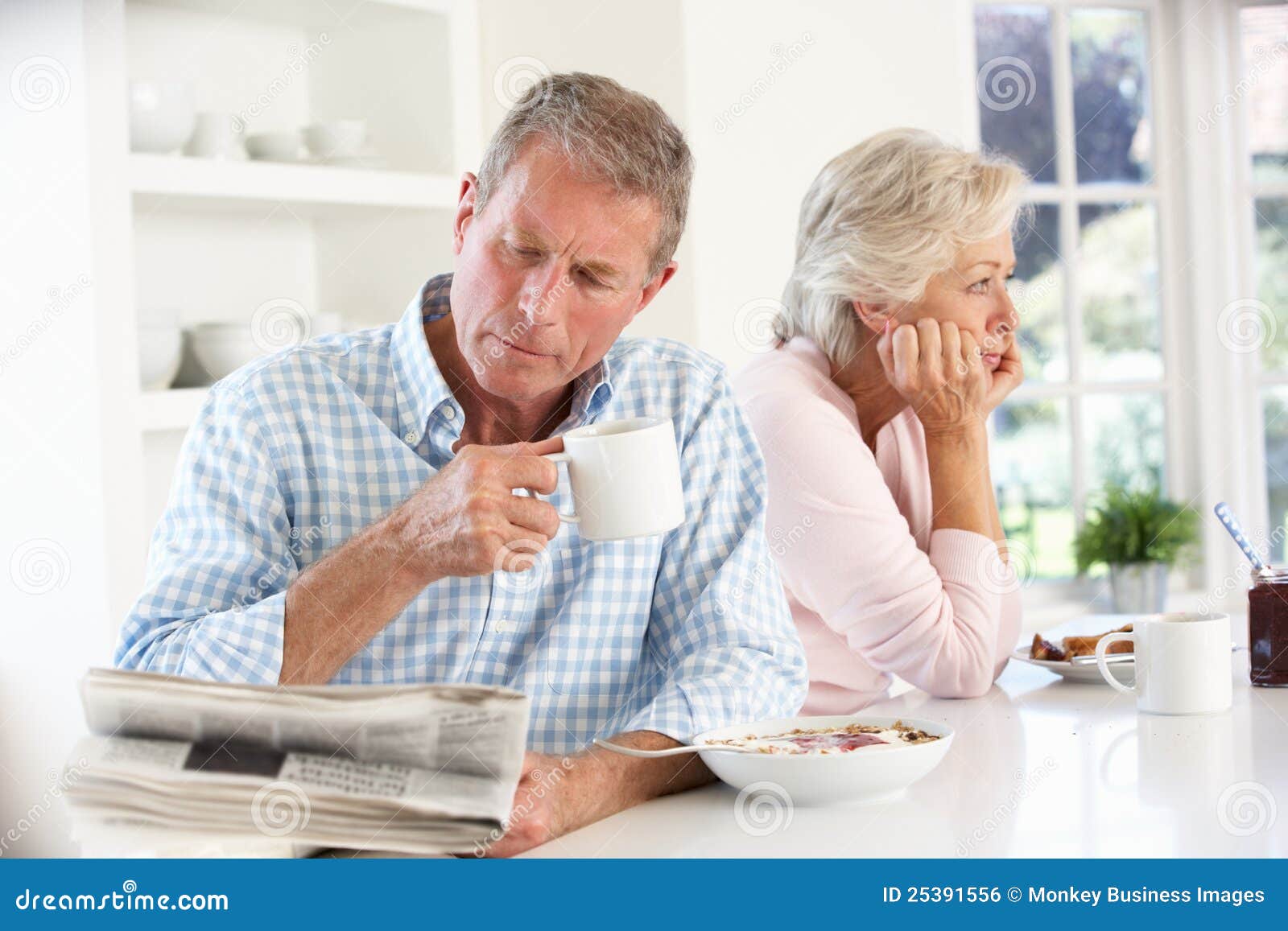 Retired Couple Eating Breakfast Stock Photo - Image of inside, reading ...