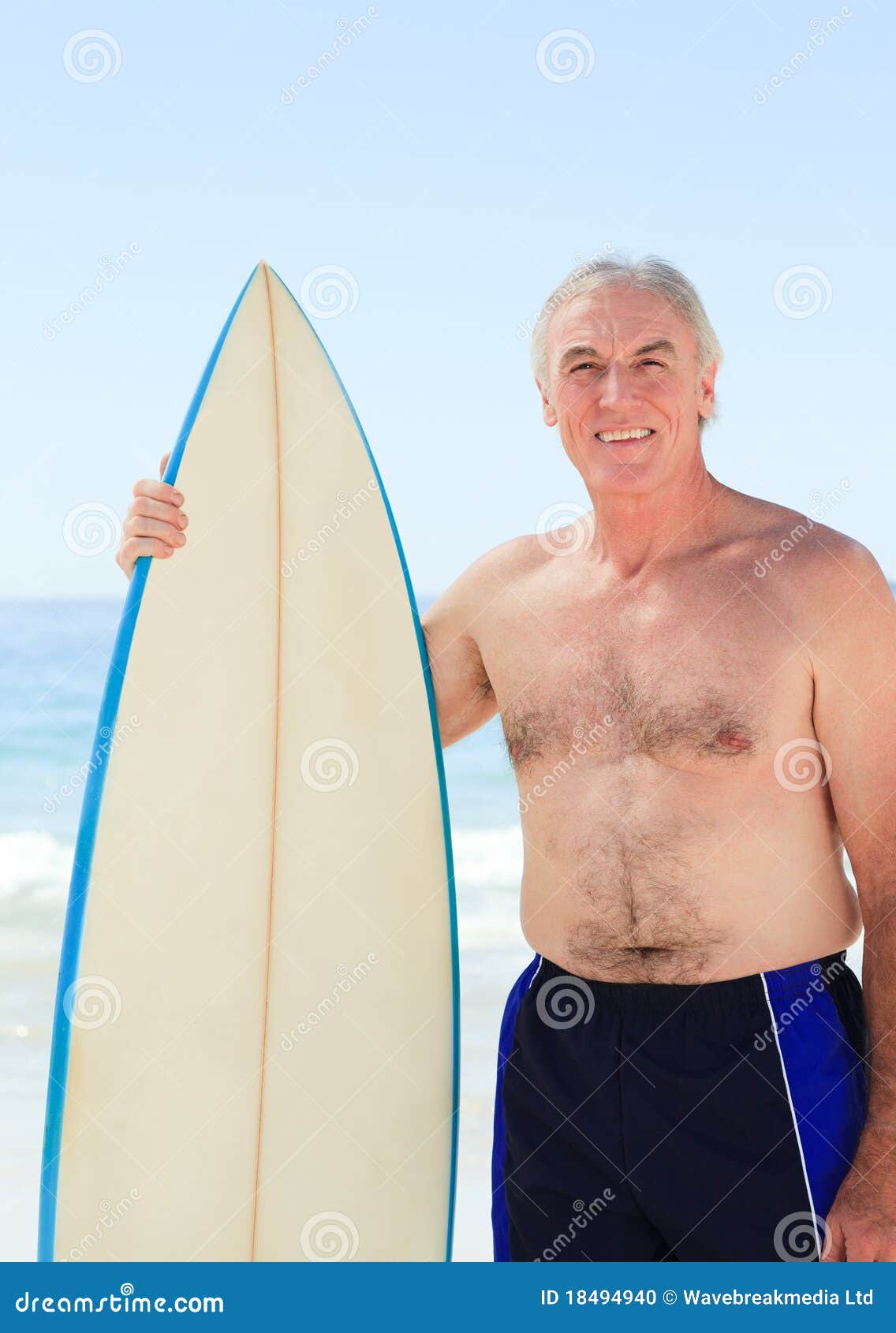 Retired Man with His Surfboard Stock Photo - Image of surfboard ...