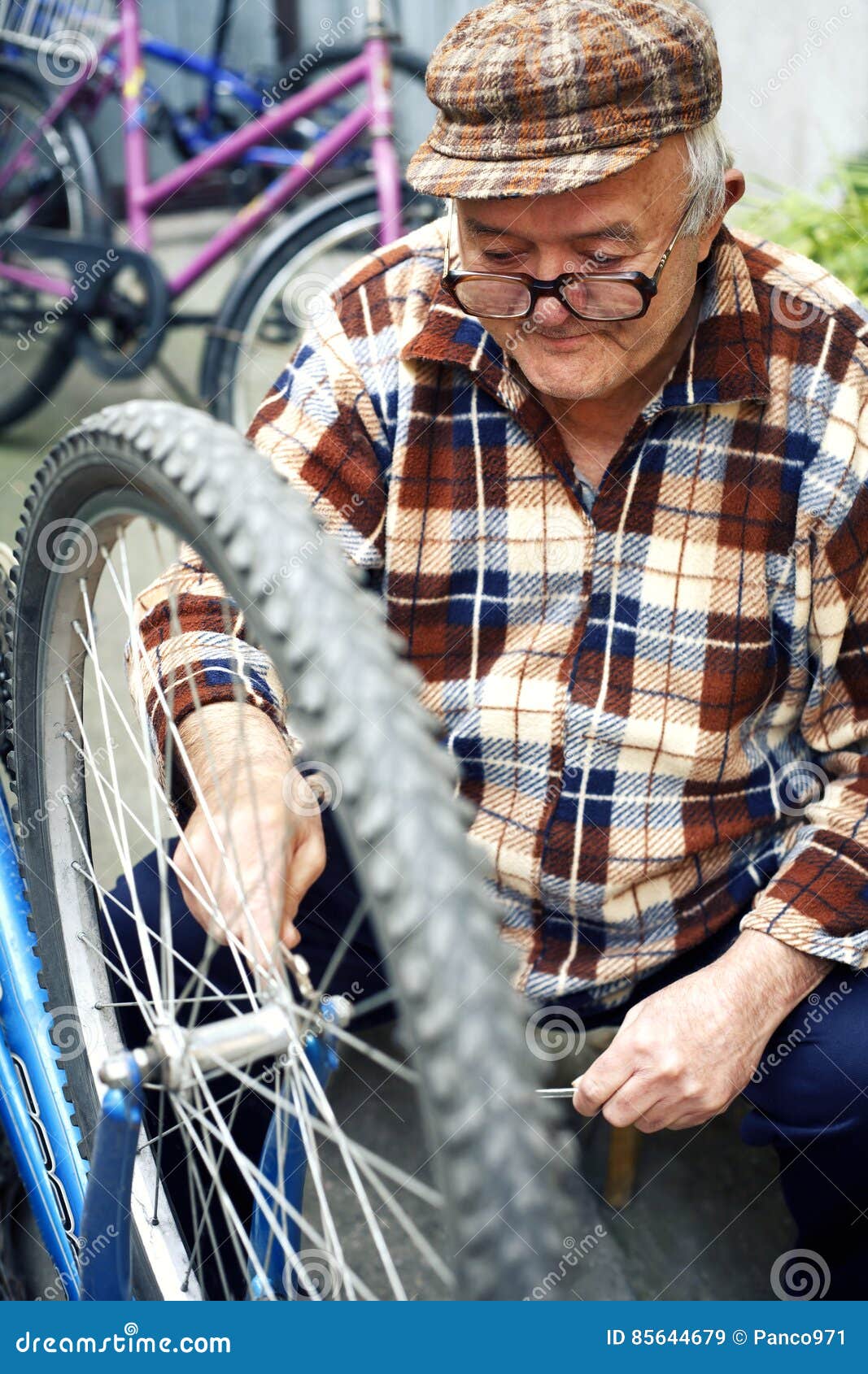 Retired man serviced bikes stock image. Image of retirement - 85644679