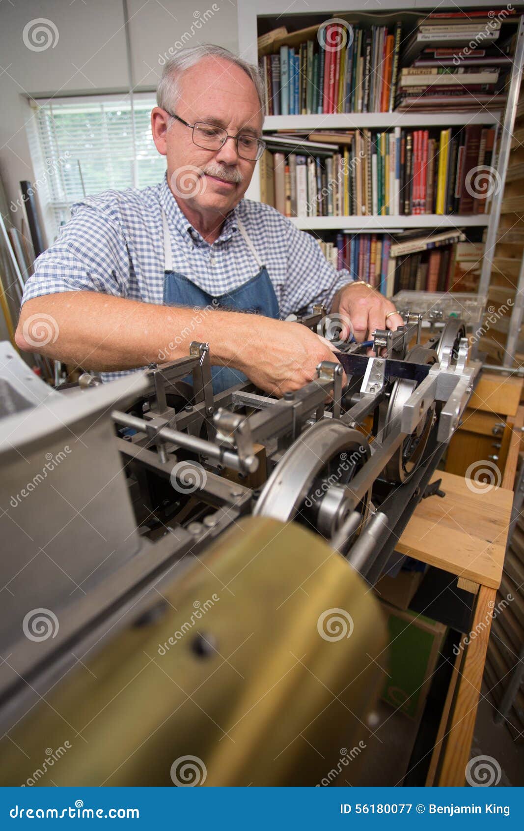 Retired man in workshop stock image. Image of senior - 56180077