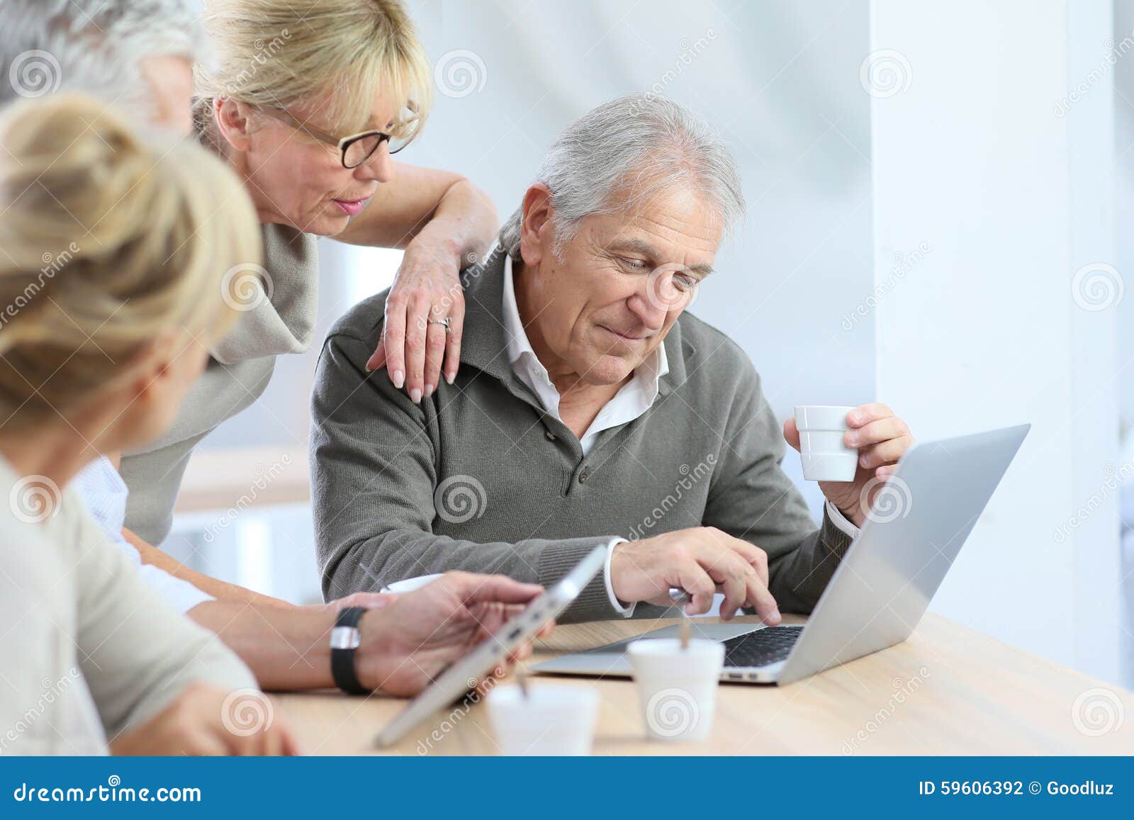 Retired People at Home with Laptop and Tablet Stock Photo - Image of ...