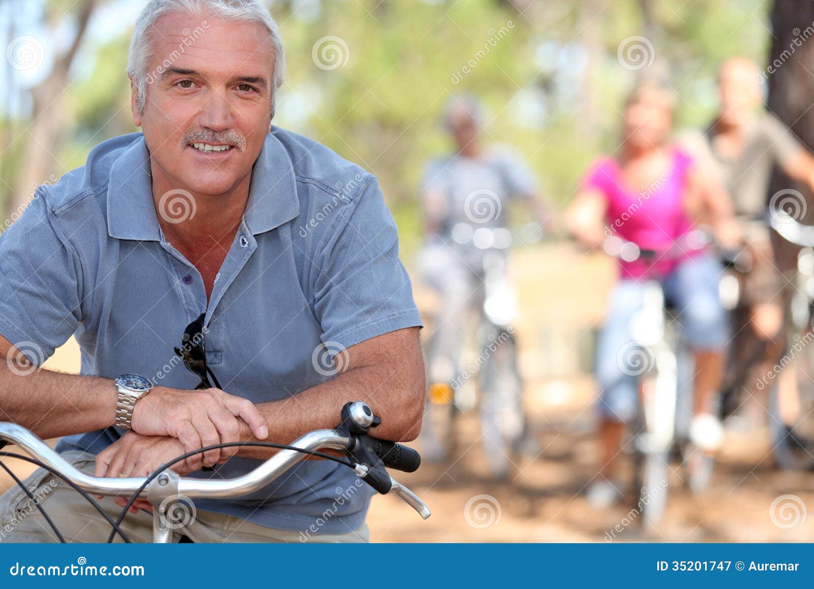Retiree having a bike ride stock image. Image of mature - 35201747
