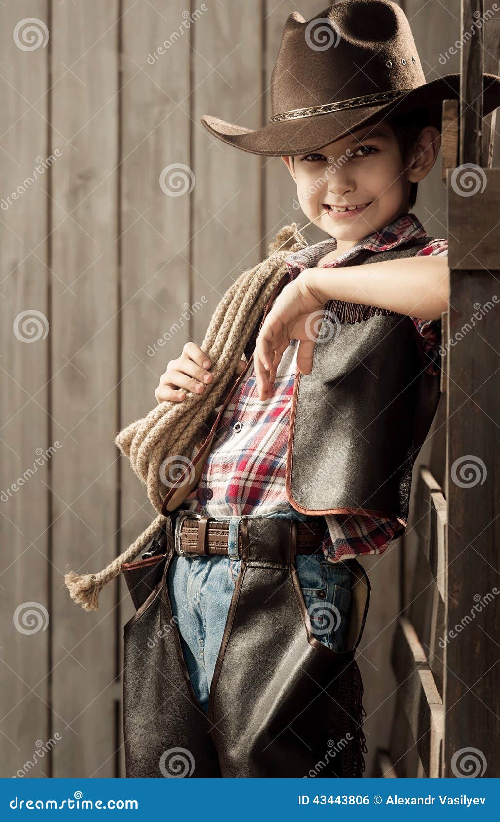 Retrato De Un Muchacho Vestido Como Vaquero Foto de archivo - Imagen de ...