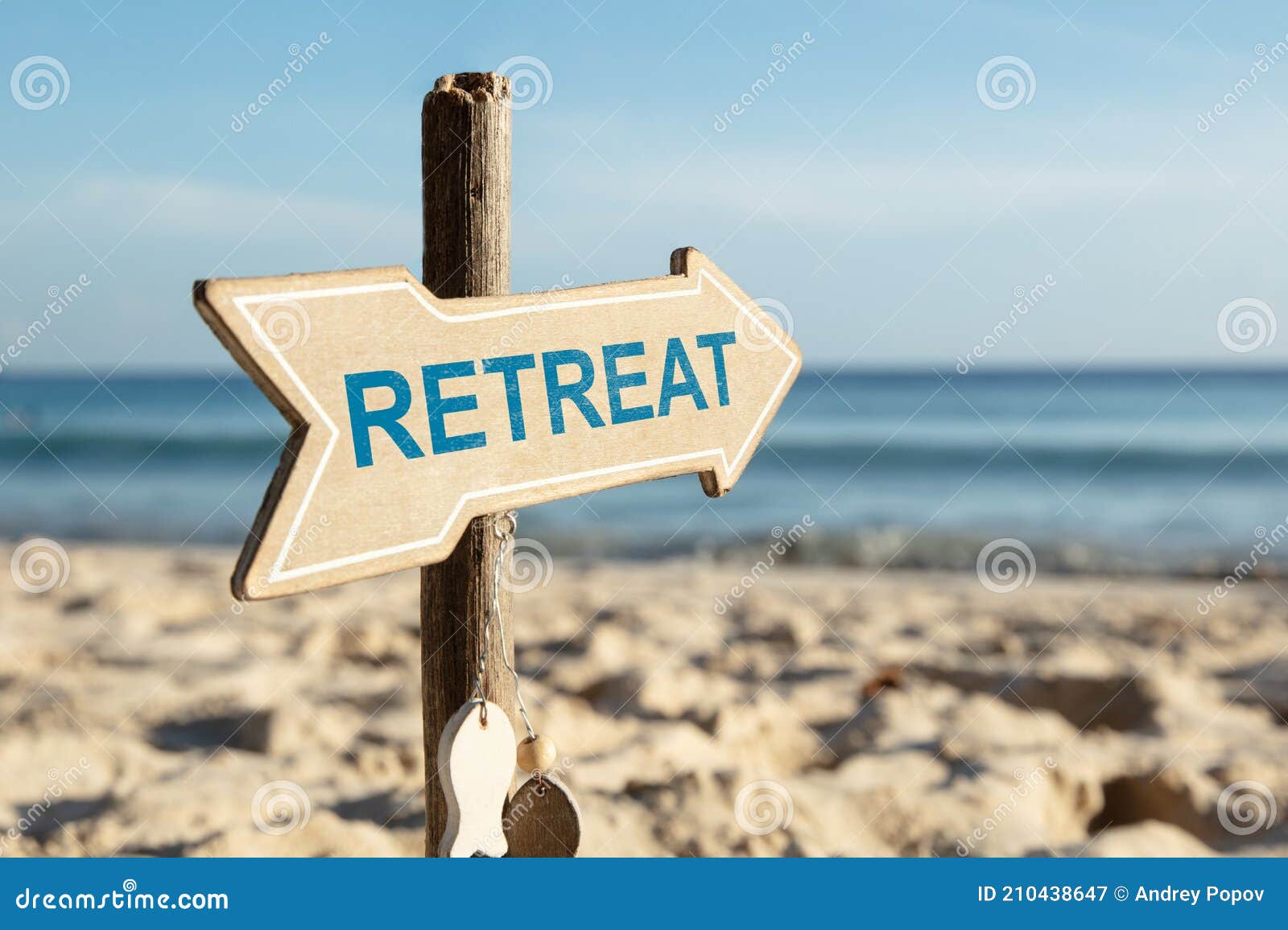 Retreat Arrow Sign on Beach Stock Image - Image of arrow, leisure ...