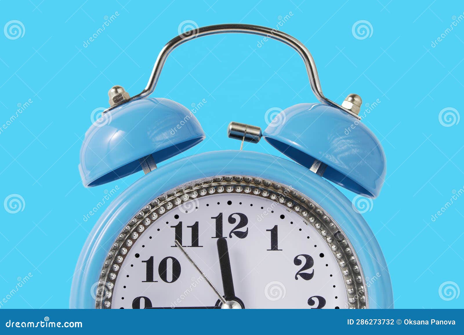Retro Alarm Clock. Close Up One Classic Alarm Clock on a Blue ...