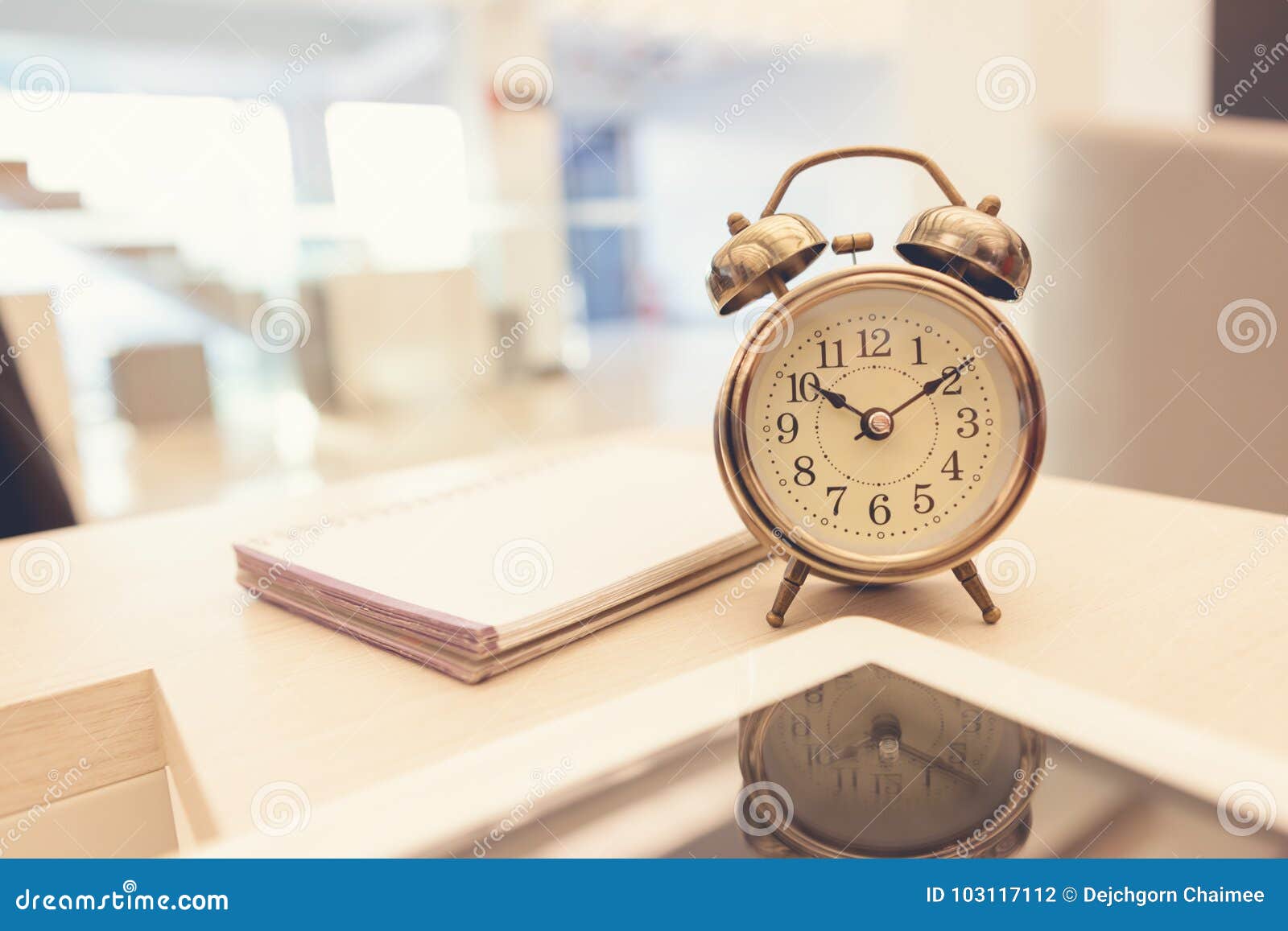 Retro alarm clock on table stock photo. Image of classic - 103117112