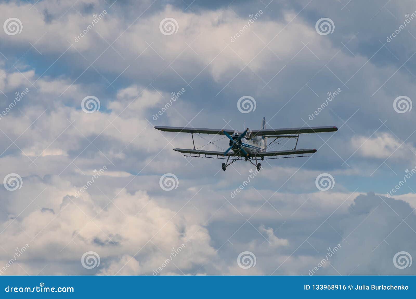 Retro Biplane in Dramatic Skies Stock Photo - Image of airshow ...