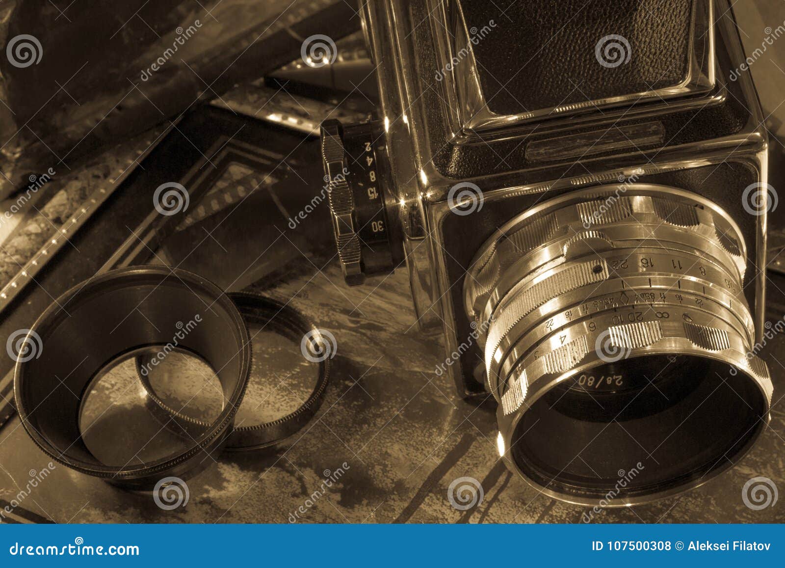 Retro camera and film stock photo. Image of analogue - 107500308