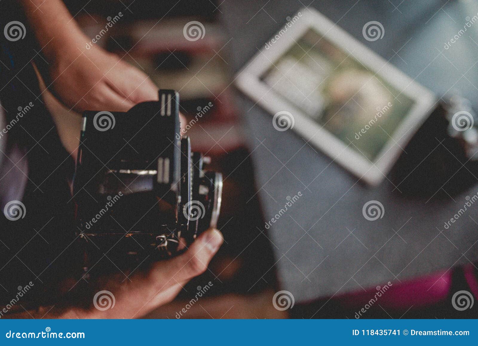 Retro camera look stock image. Image of television, hand - 118435741