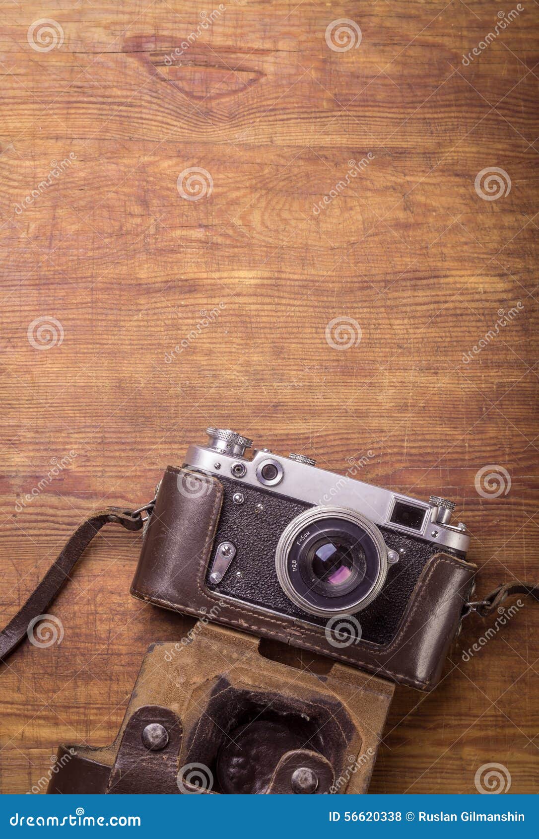 Retro camera on wood table stock photo. Image of closeup - 56620338
