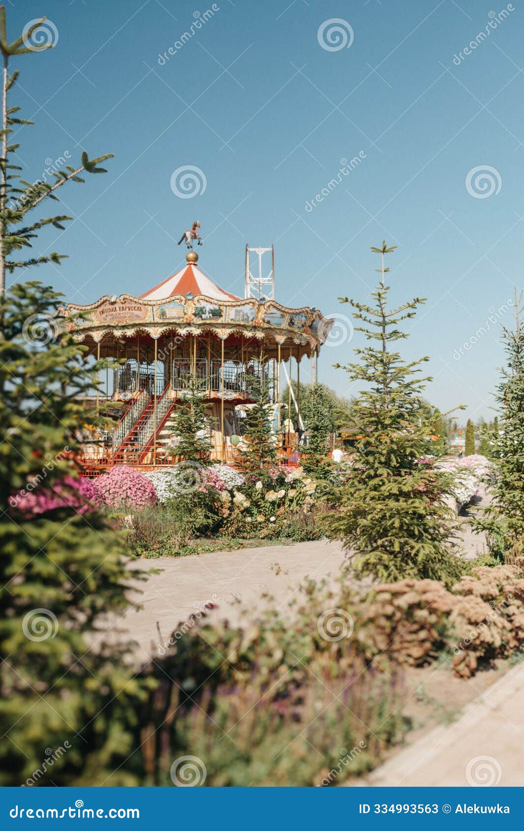A Retro Carousel with a Pink Flower in the Middle of it Stock Image ...