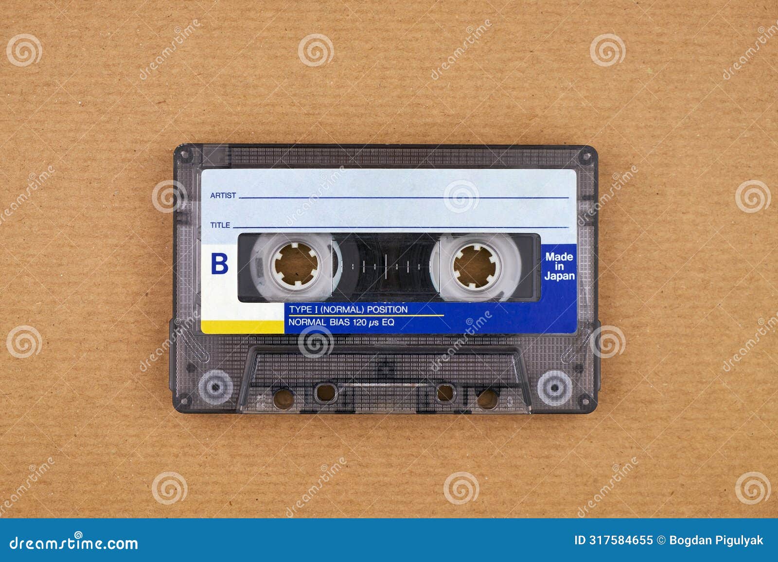 Retro Cassette Tape on a Textured Paper Surface Stock Image - Image of ...
