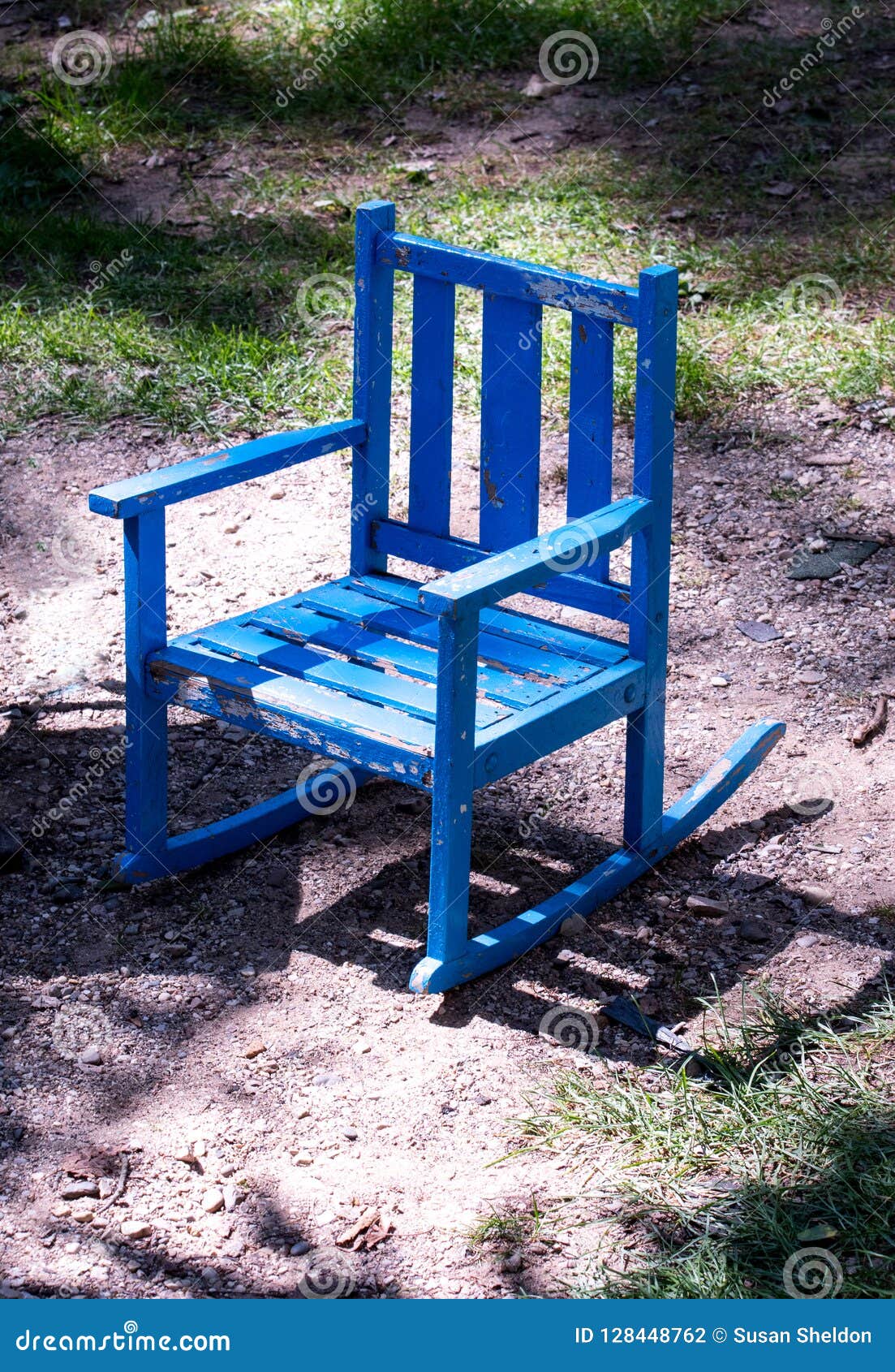 Retro Child`s Blue Rocking Chair in Dappled Sunlight Stock Photo ...