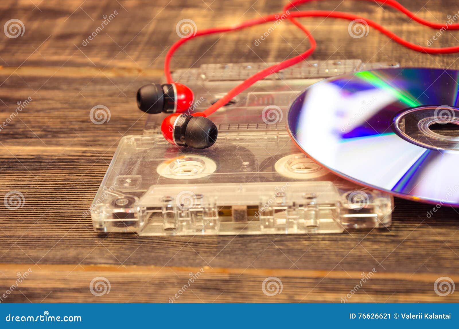 Retro Compact Cassette with Disc and Headphones on Wood. Stock Image ...